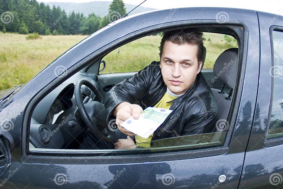Driver in Car with Money stock photo. Image of driven - 5907446