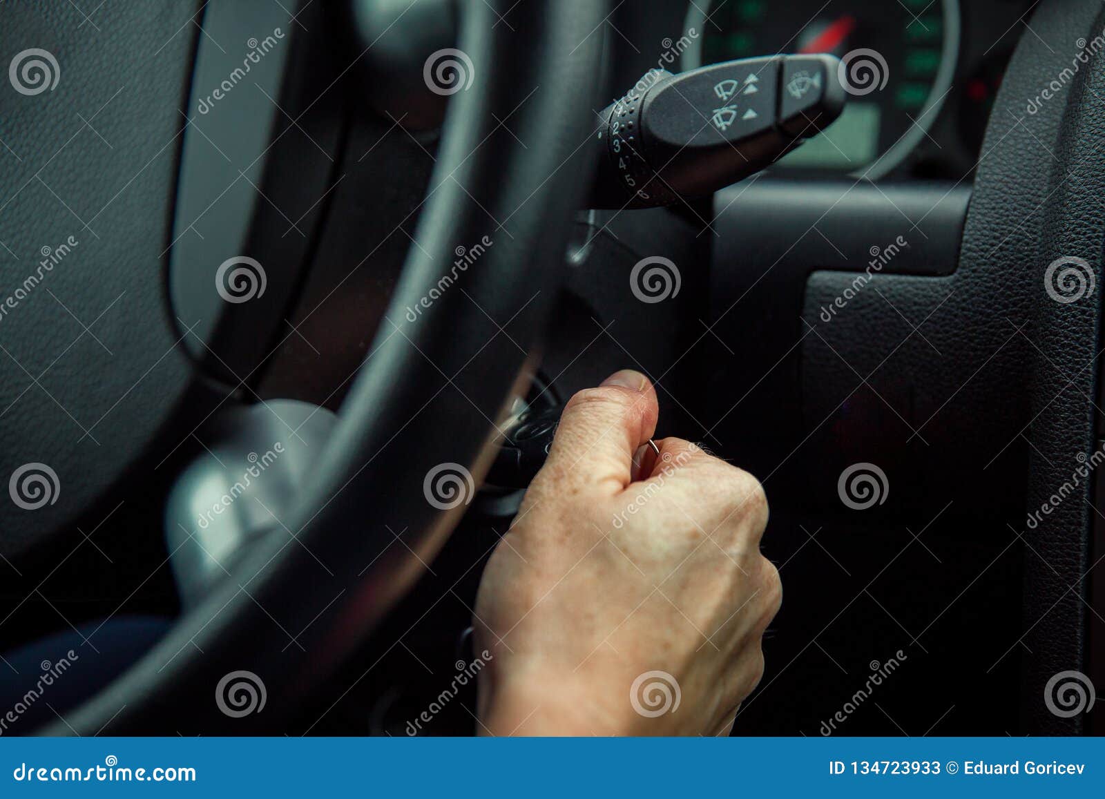 A Driver in a Car Performs Tasks Necessary To Steer the Vehicle Stock ...