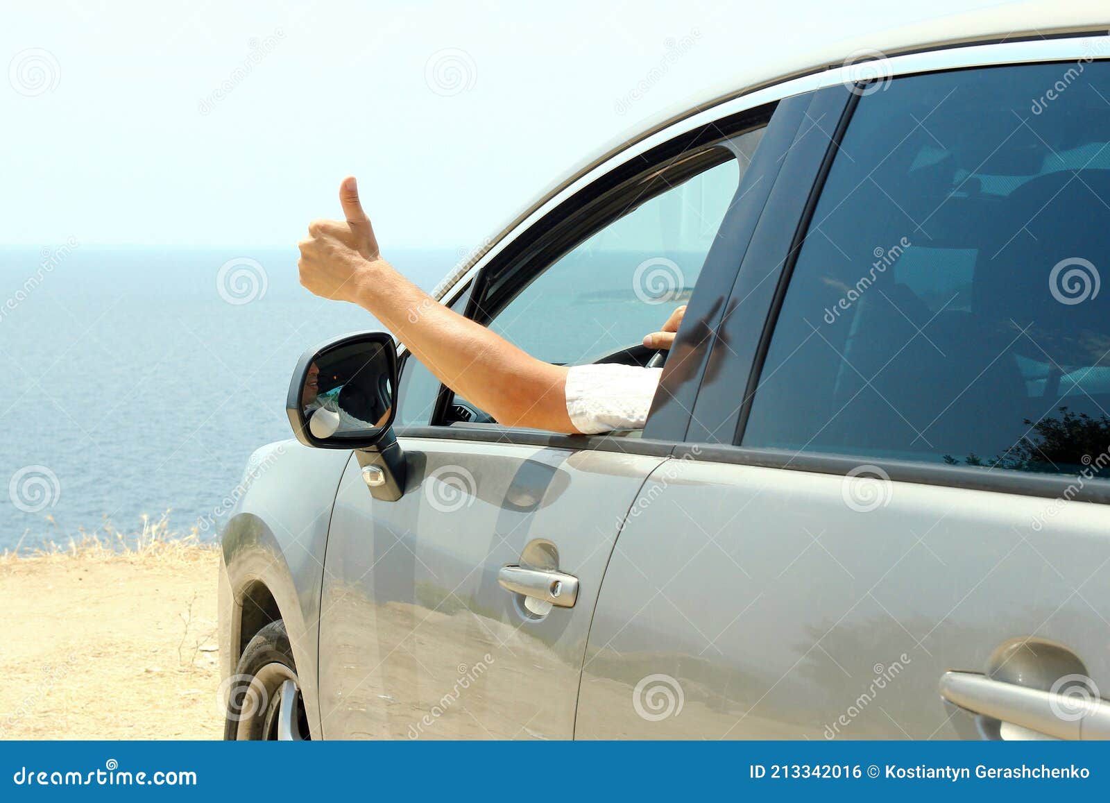 Driver in car at sea stock photo. Image of road, drive - 213342016
