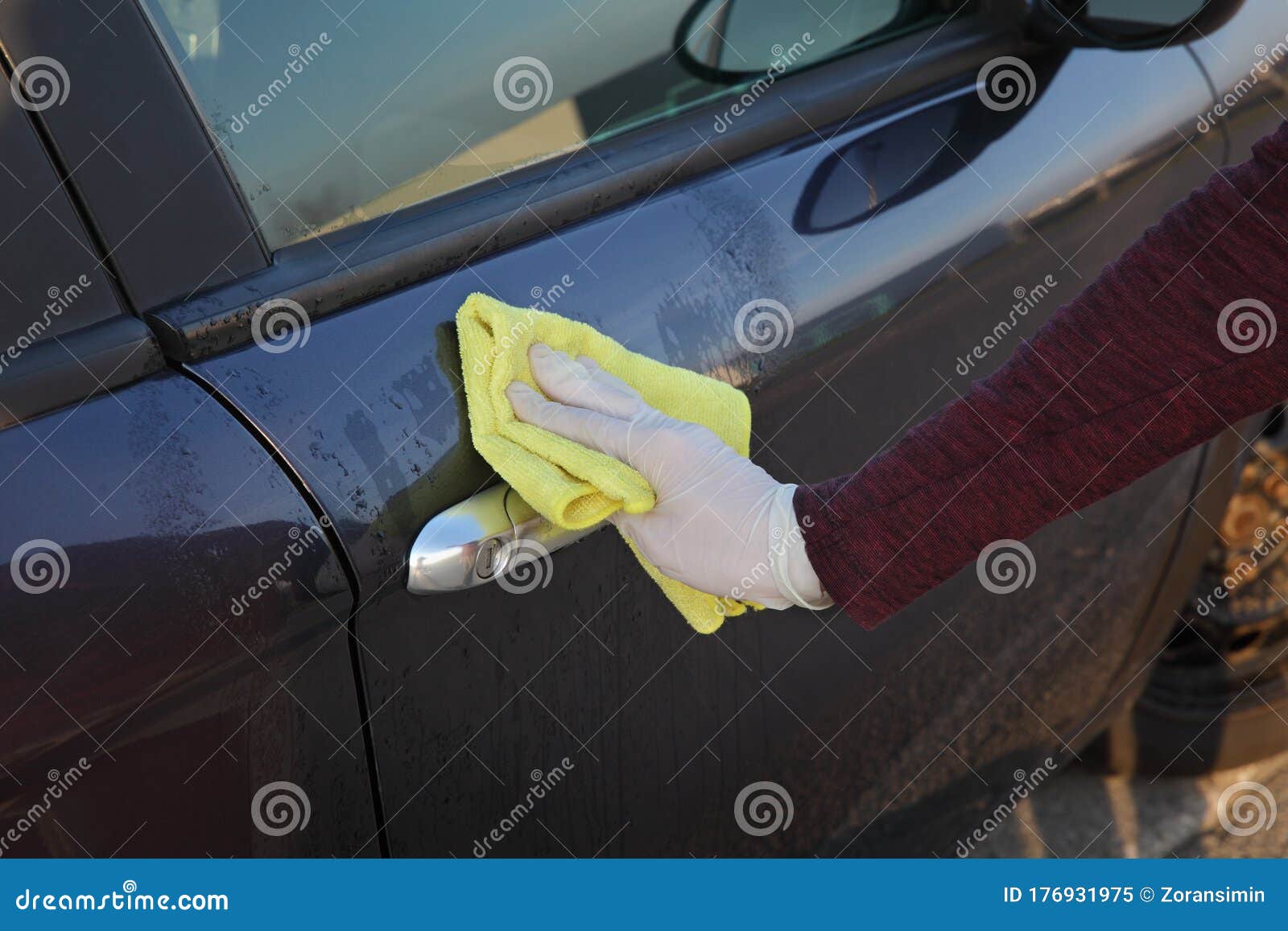 Driver Cleaning Car Handle Using Antibacterial Solution and Cloth Stock ...