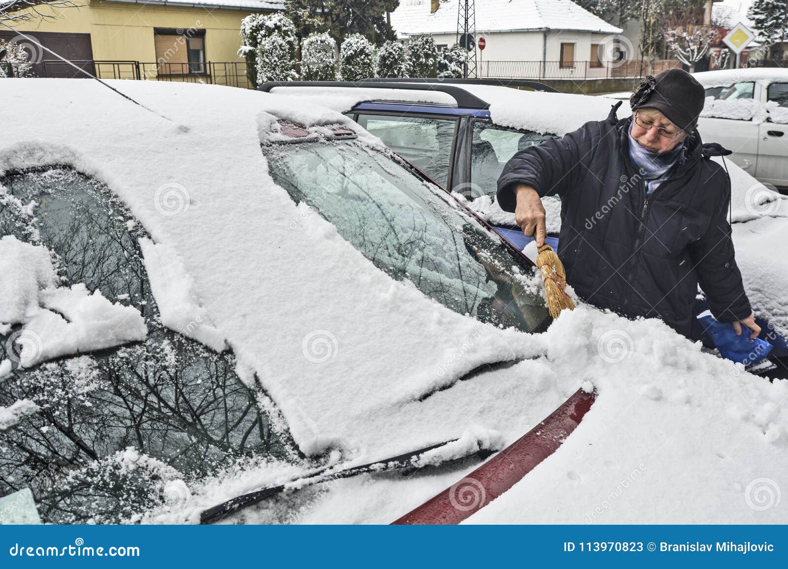 Driver Cleaning Snow from the Windshield Stock Image - Image of manual ...