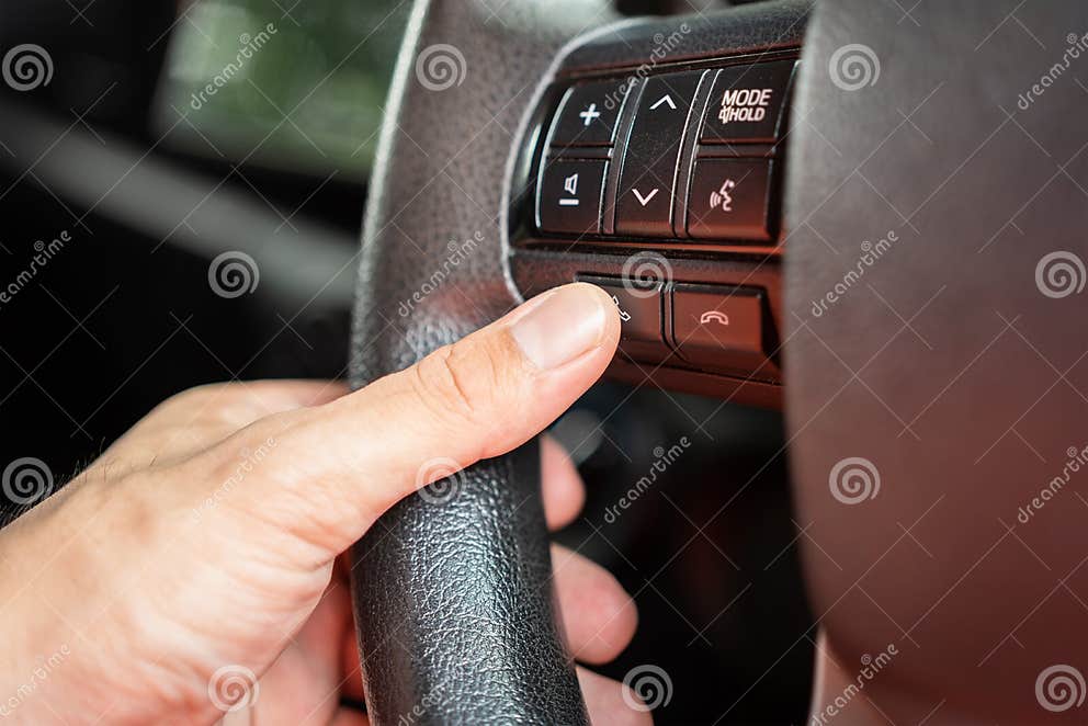 A Driver is Controlling on Multifunction Steering Wheel. Stock Photo ...
