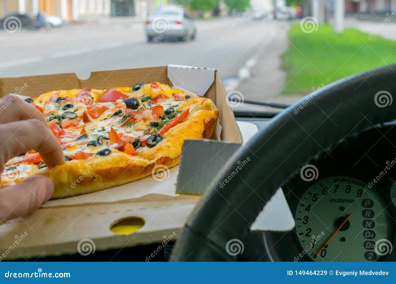 Driver Eats Pizza in the Car Stock Image - Image of pizza, food: 149464229