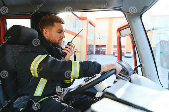 Driver of a Fire Truck in Action Stock Photo - Image of male, adult ...