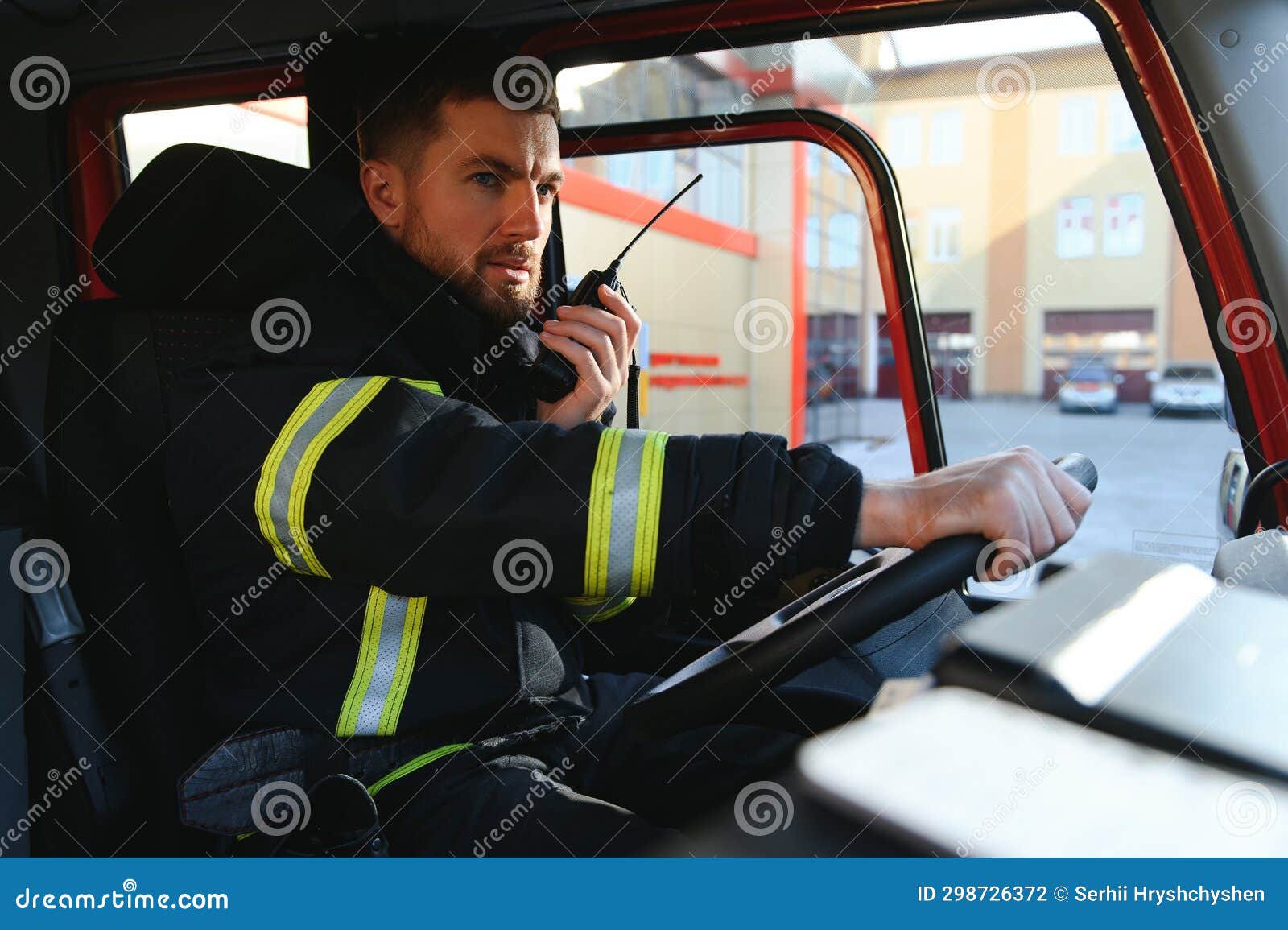 Driver of a Fire Truck in Action Stock Photo - Image of uniform ...