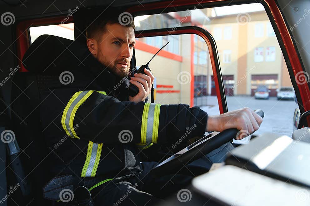 Driver of a Fire Truck in Action Stock Photo - Image of uniform ...