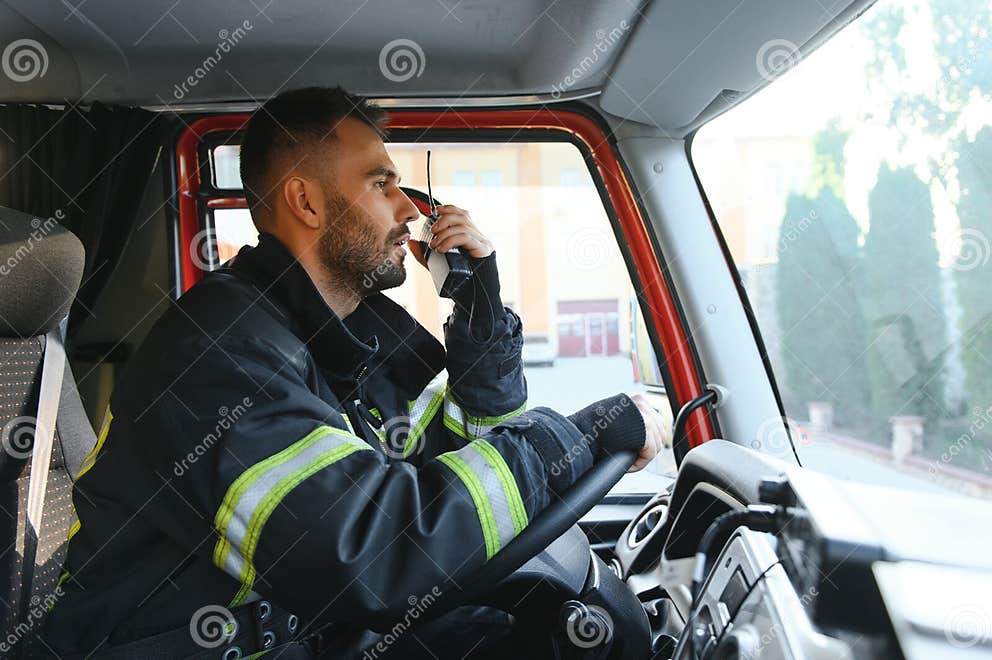 Driver of a Fire Truck in Action Stock Photo - Image of person, safety ...