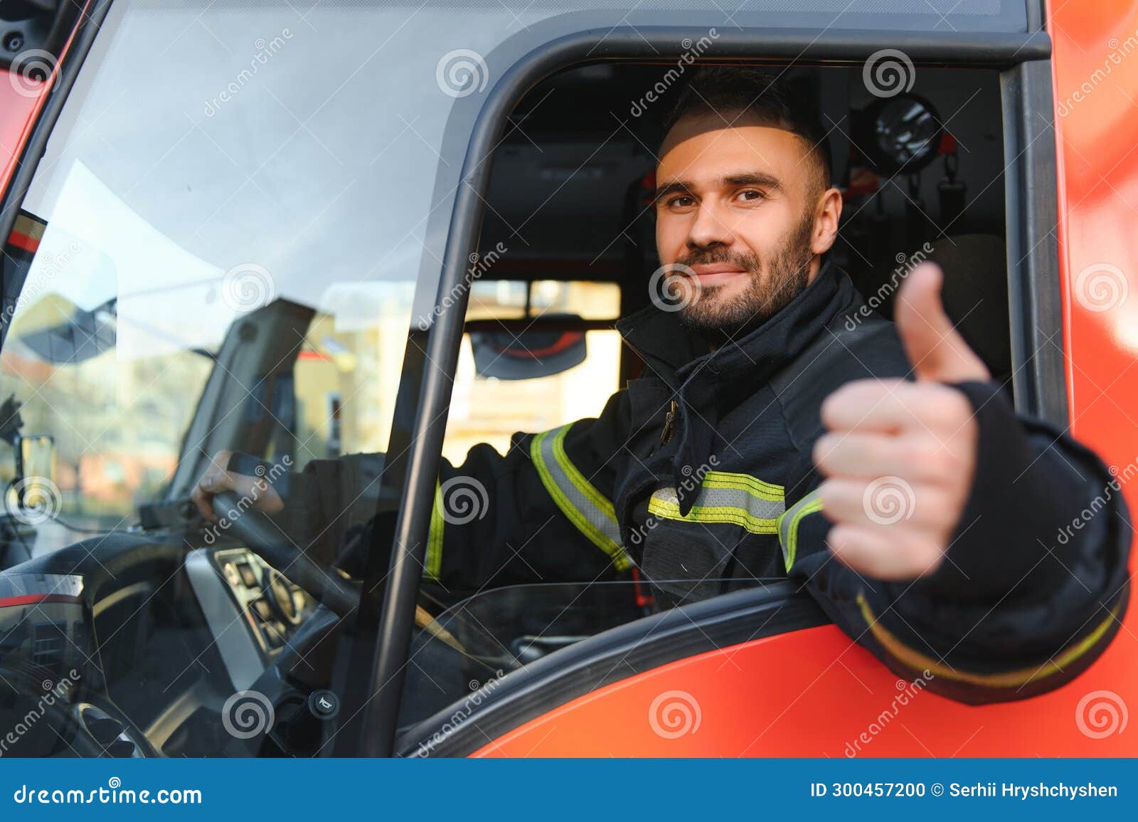 Driver of a Fire Truck in Action Stock Photo - Image of confident ...