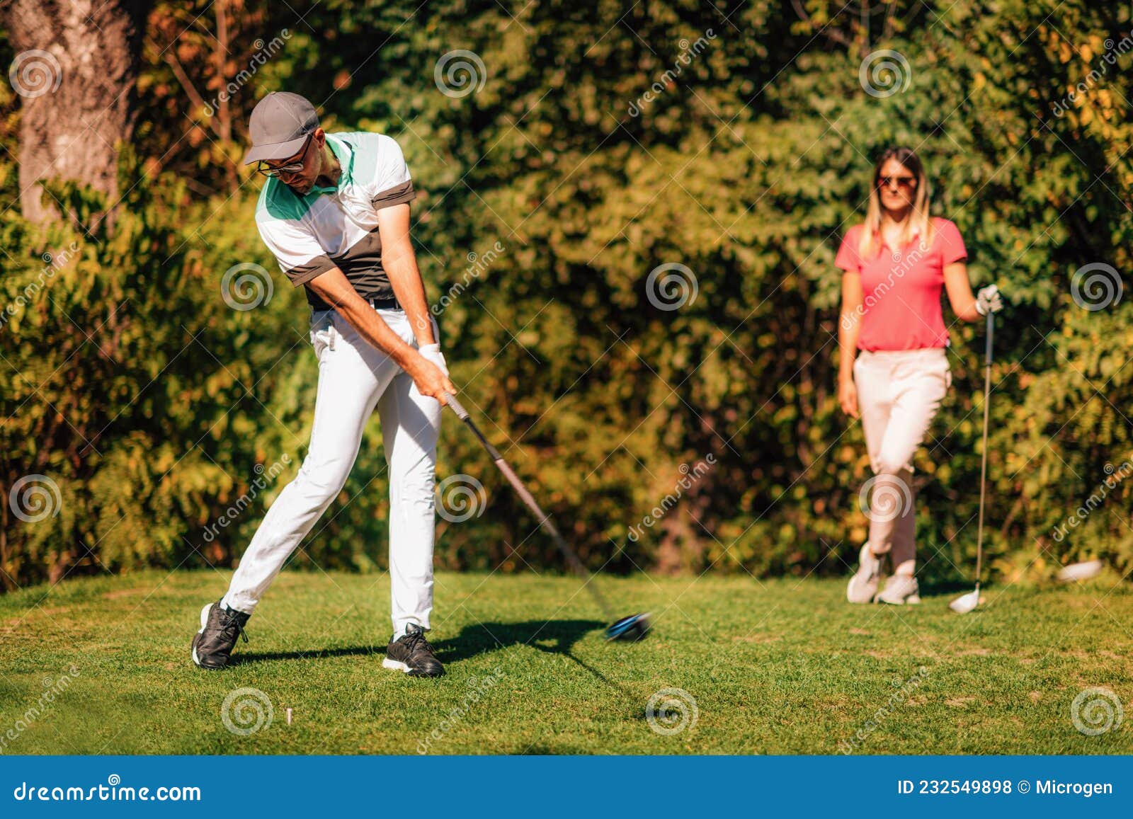 Driver Golf Swing from the Tee Box Stock Photo - Image of ball, couple ...
