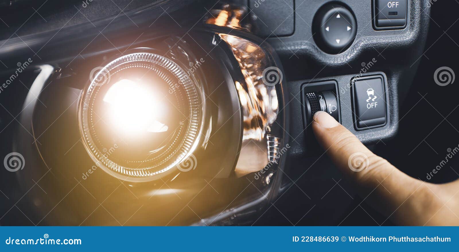 Driver Hand Adjusting Headlight Level Switch and Car Headlight Bright ...