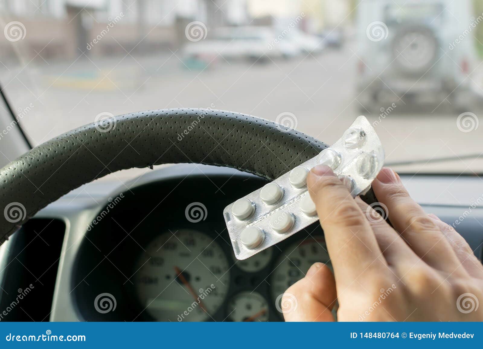 Driver hand holds a pills stock photo. Image of nervousness - 148480764