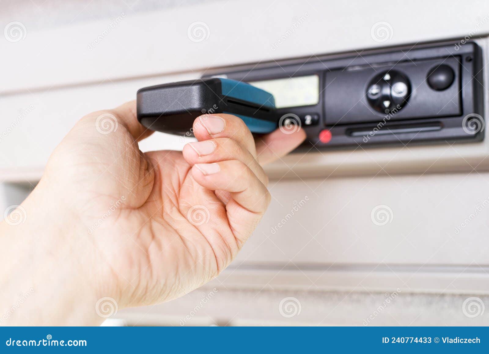 Driver Holding a Digital Tachograph Reader with Isolated White Screen ...