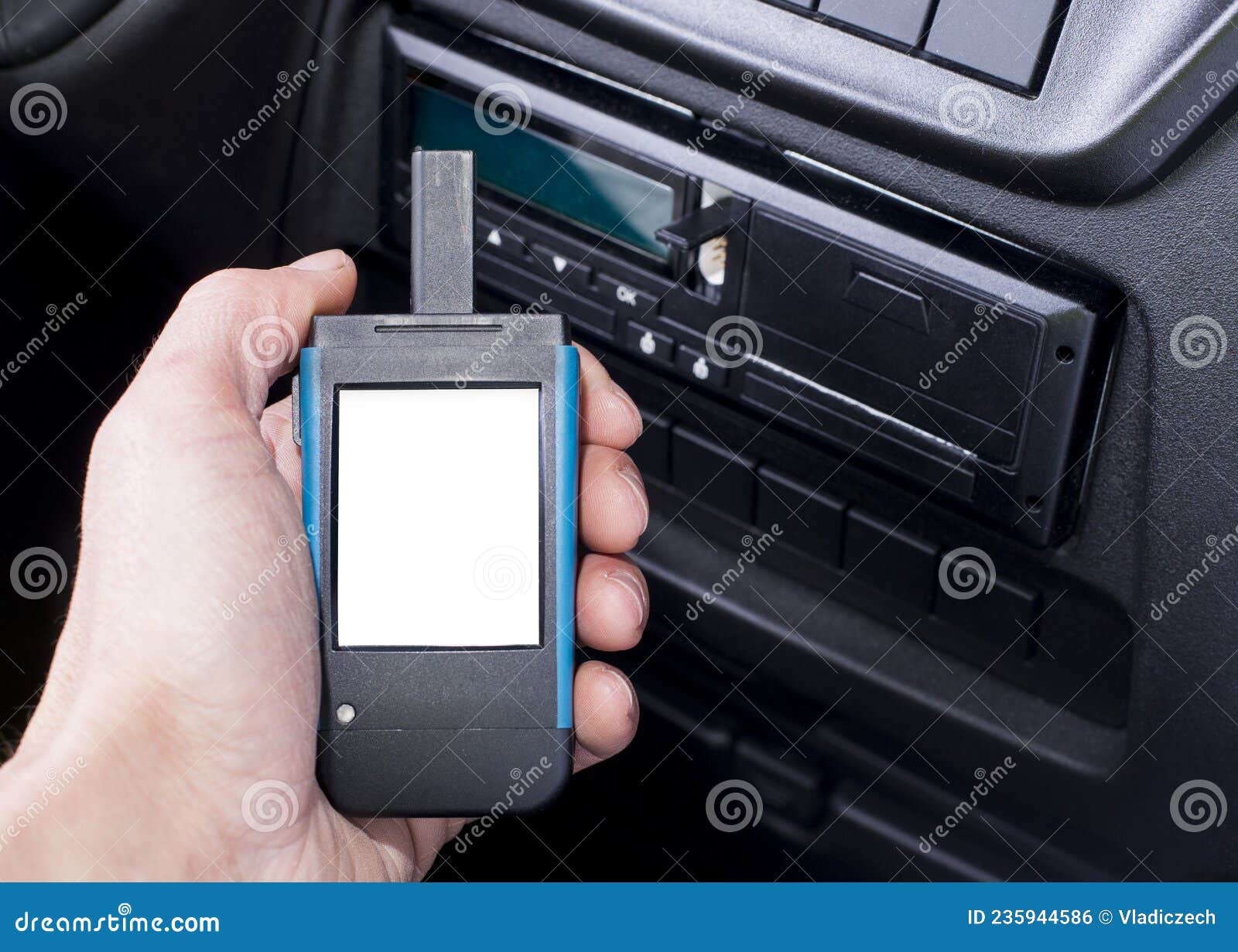 Driver Holding a Digital Tachograph Reader with White Screen ...