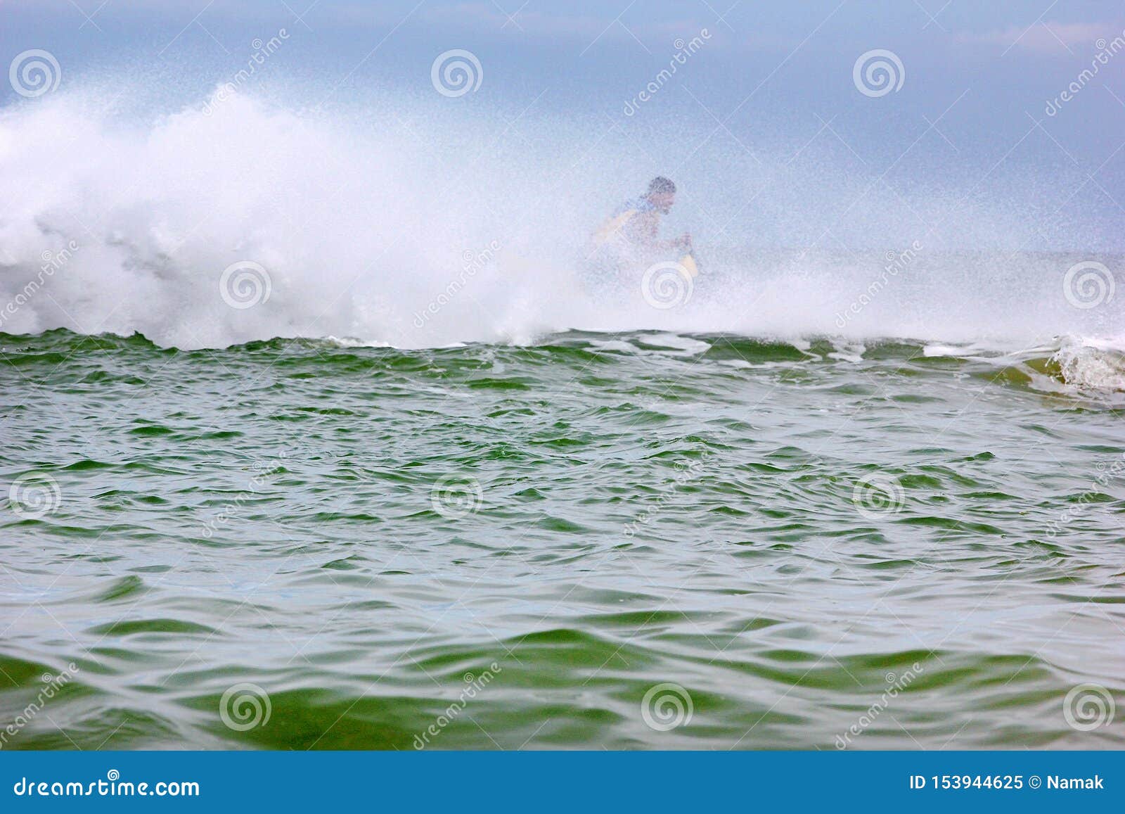 Driver on the Jet Ski Creates a Water Spray when Driving Stock Image ...
