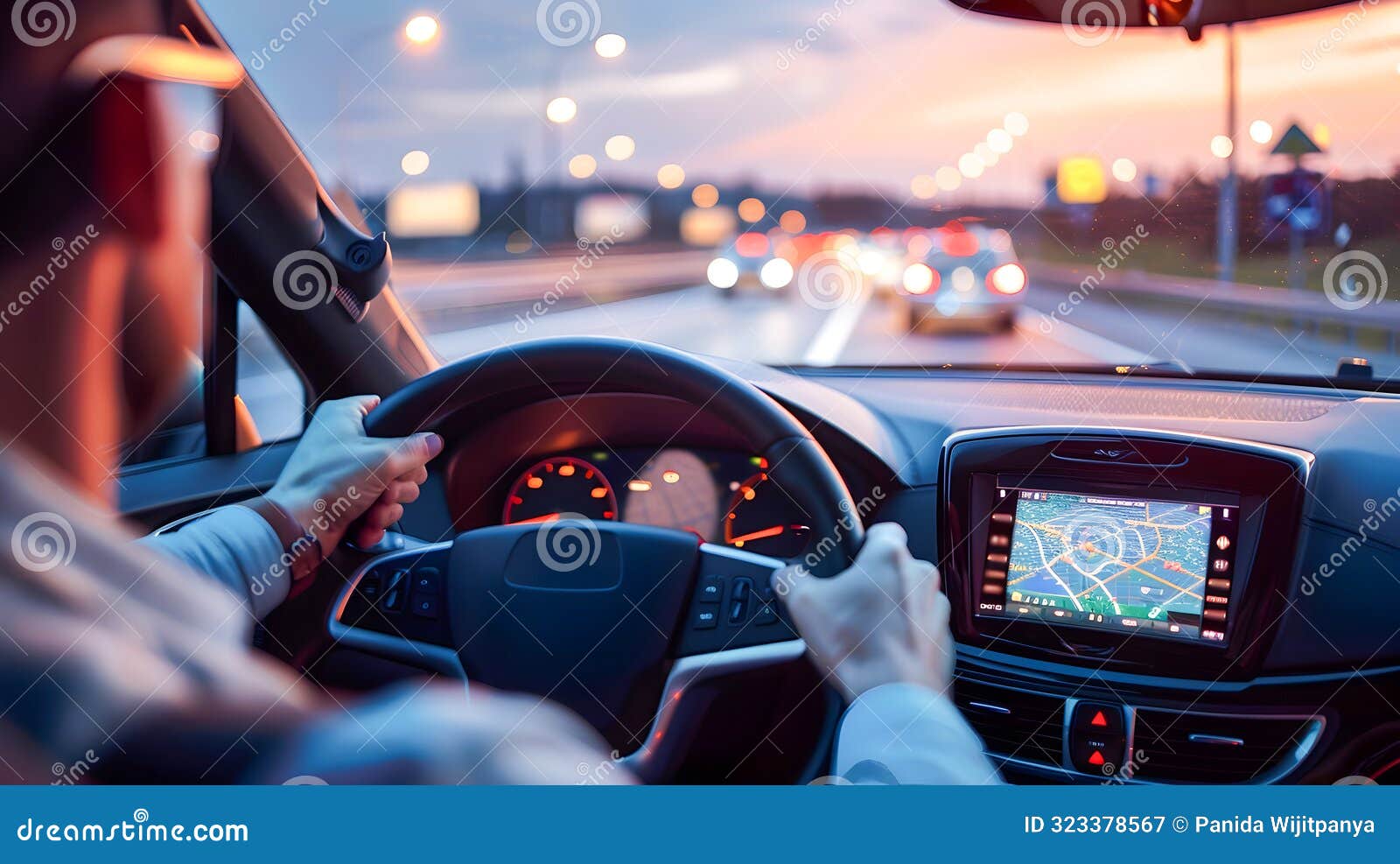 Driver Navigating on the Highway at Night Using a GPS Navigation Device ...