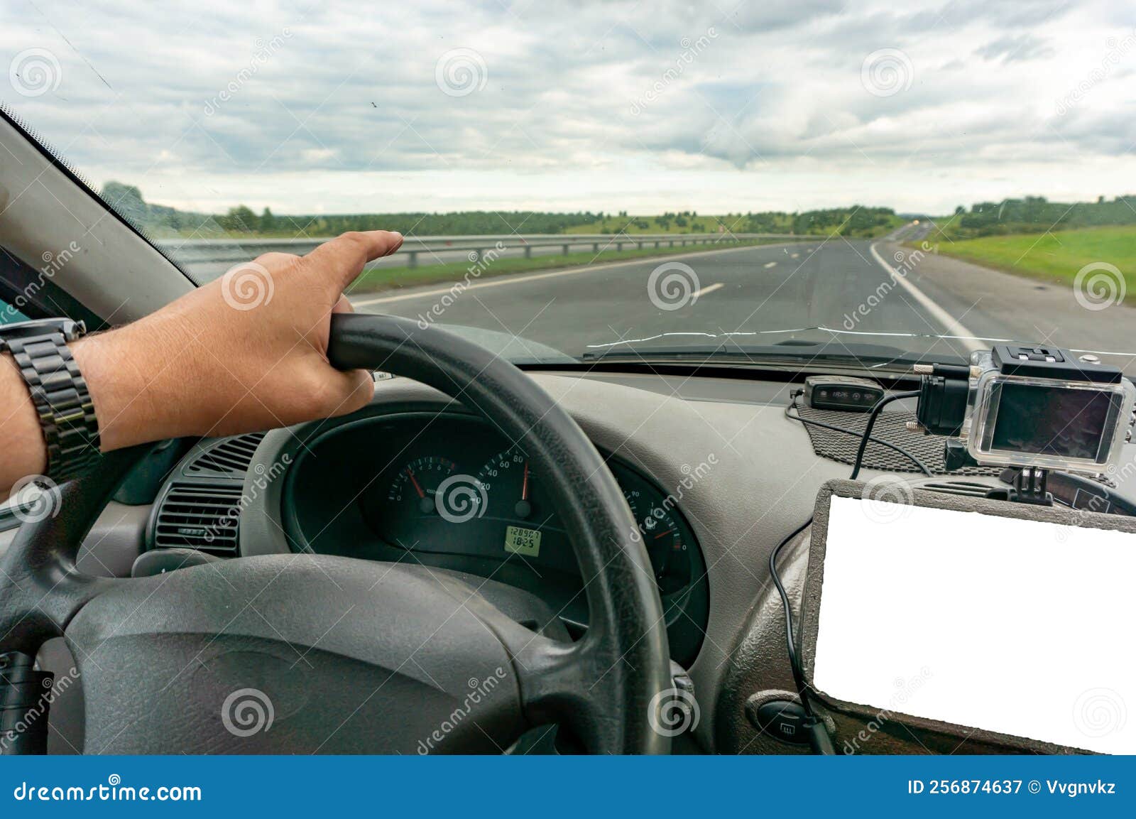 The Driver Points His Finger at the Wheel of the Car Stock Image ...