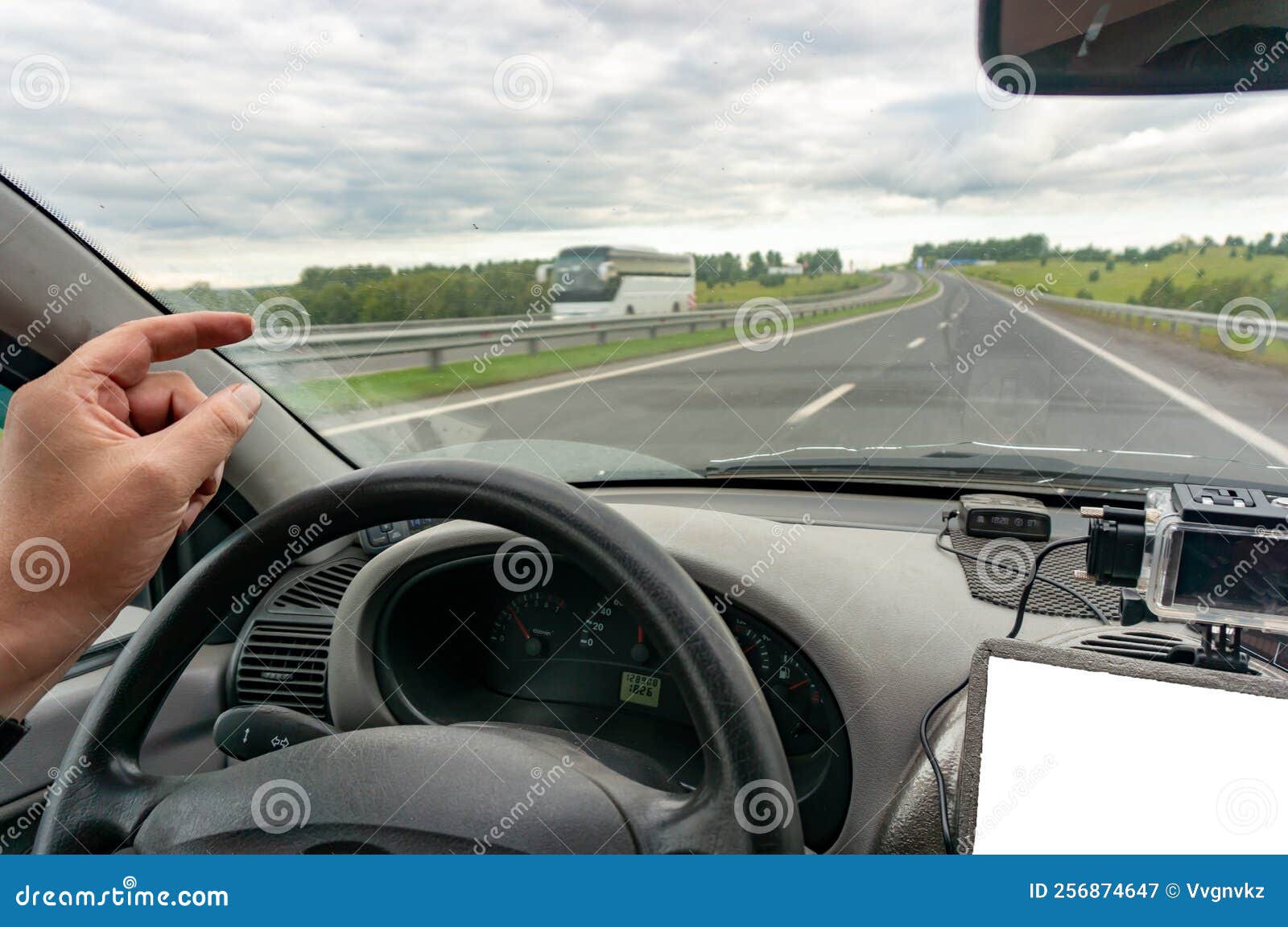 The Driver Points His Finger at the Wheel of the Car Stock Image ...