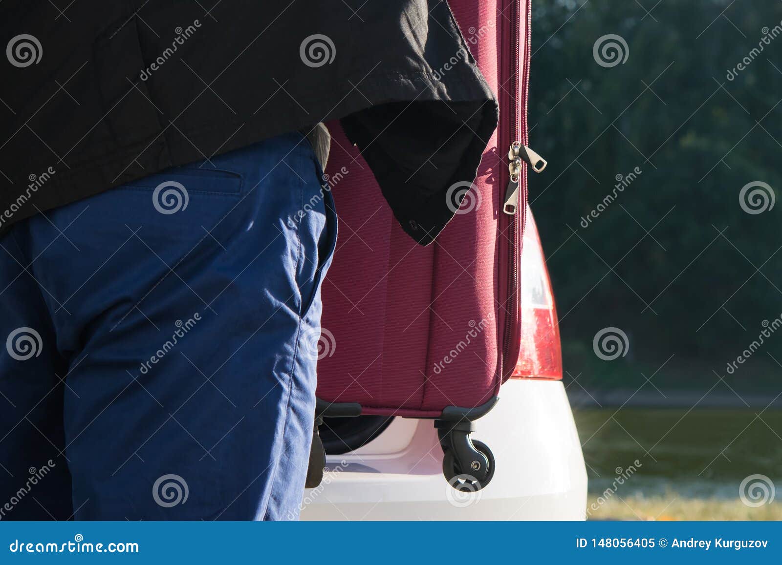 The Driver Puts a Suitcase in the Trunk with Things To Rest Stock Image ...