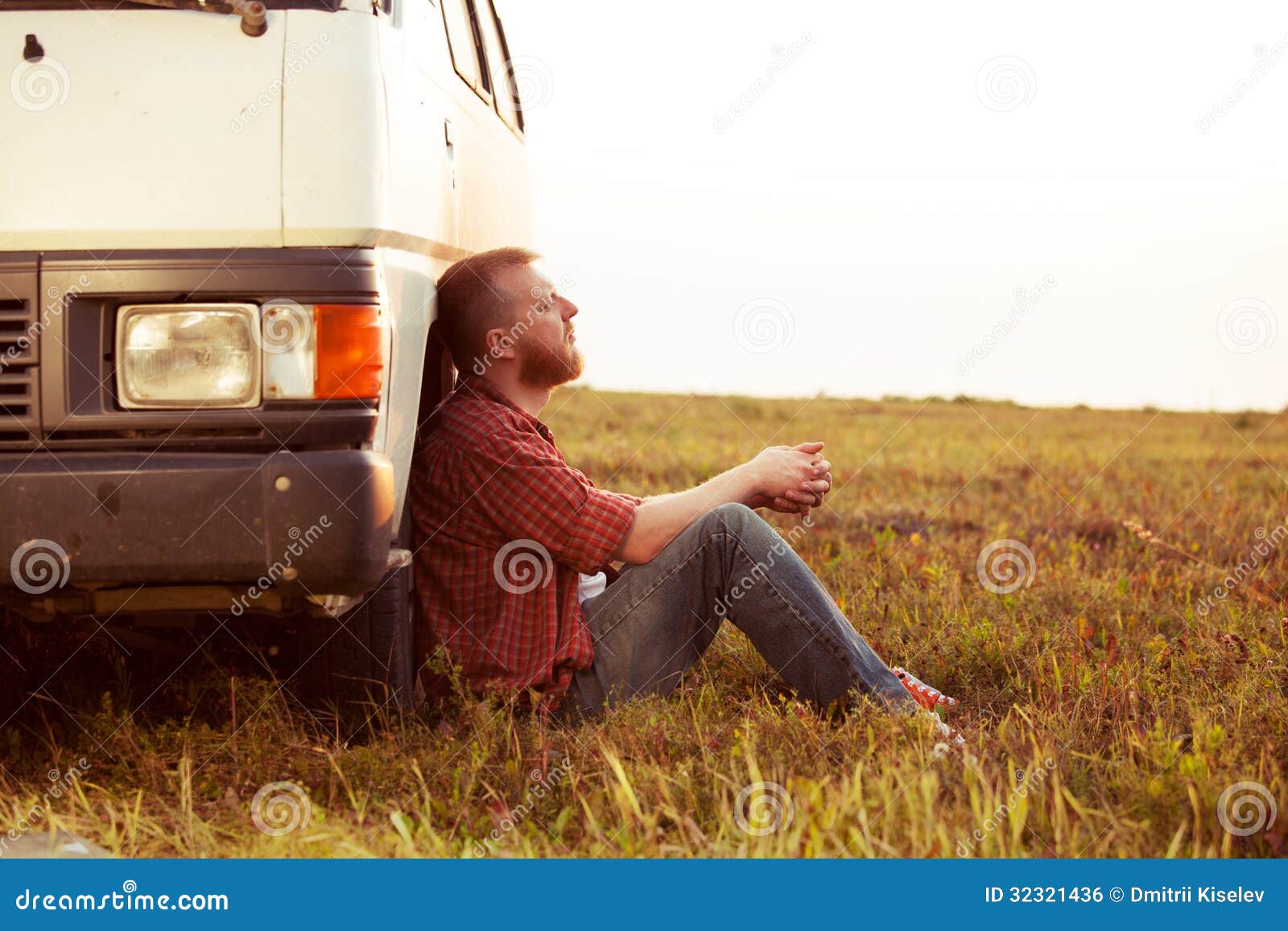 Driver Resting in a Field Near His Car Stock Photo - Image of chauffeur ...