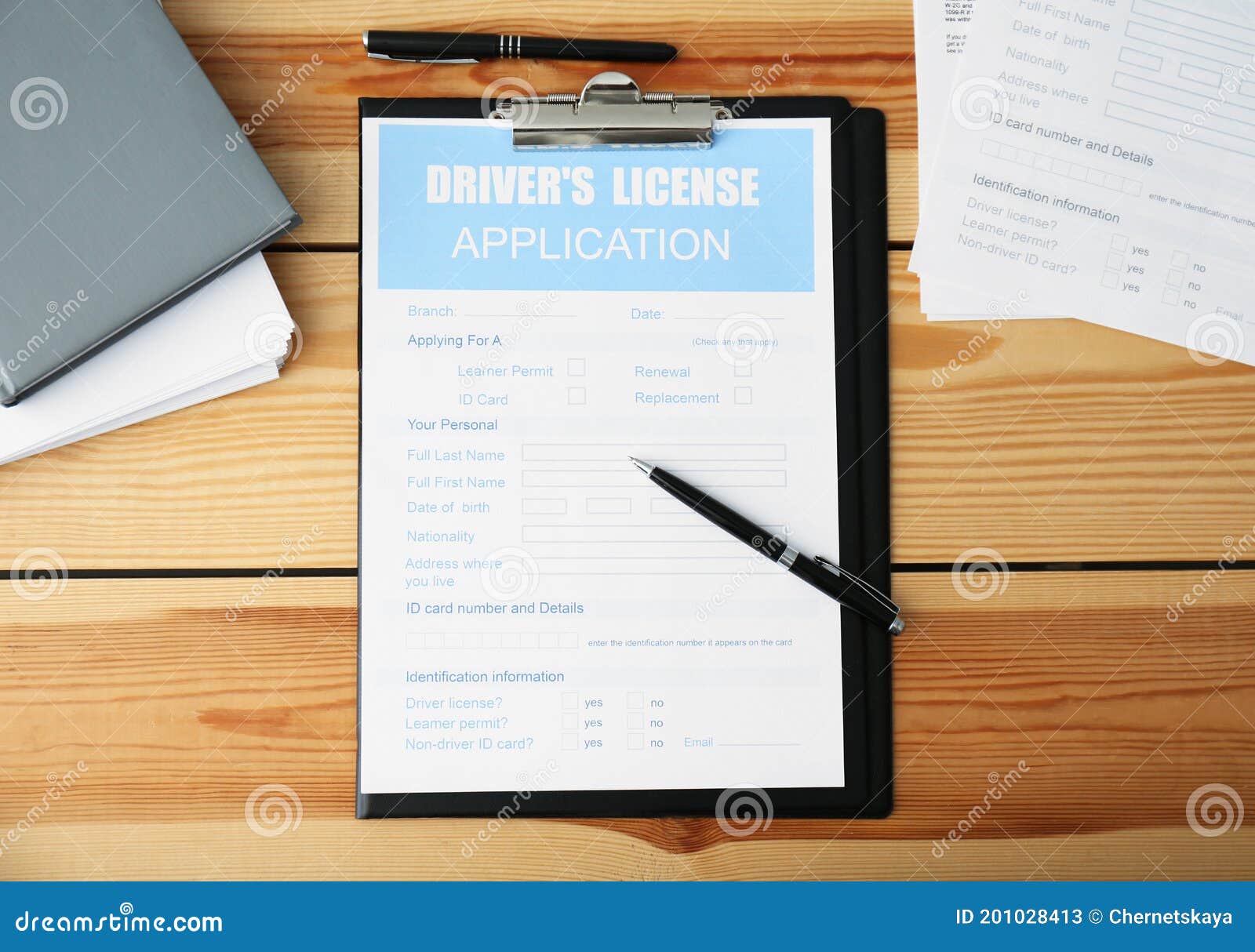 Driver`s License Application Form, Documents and Stationery on Wooden ...
