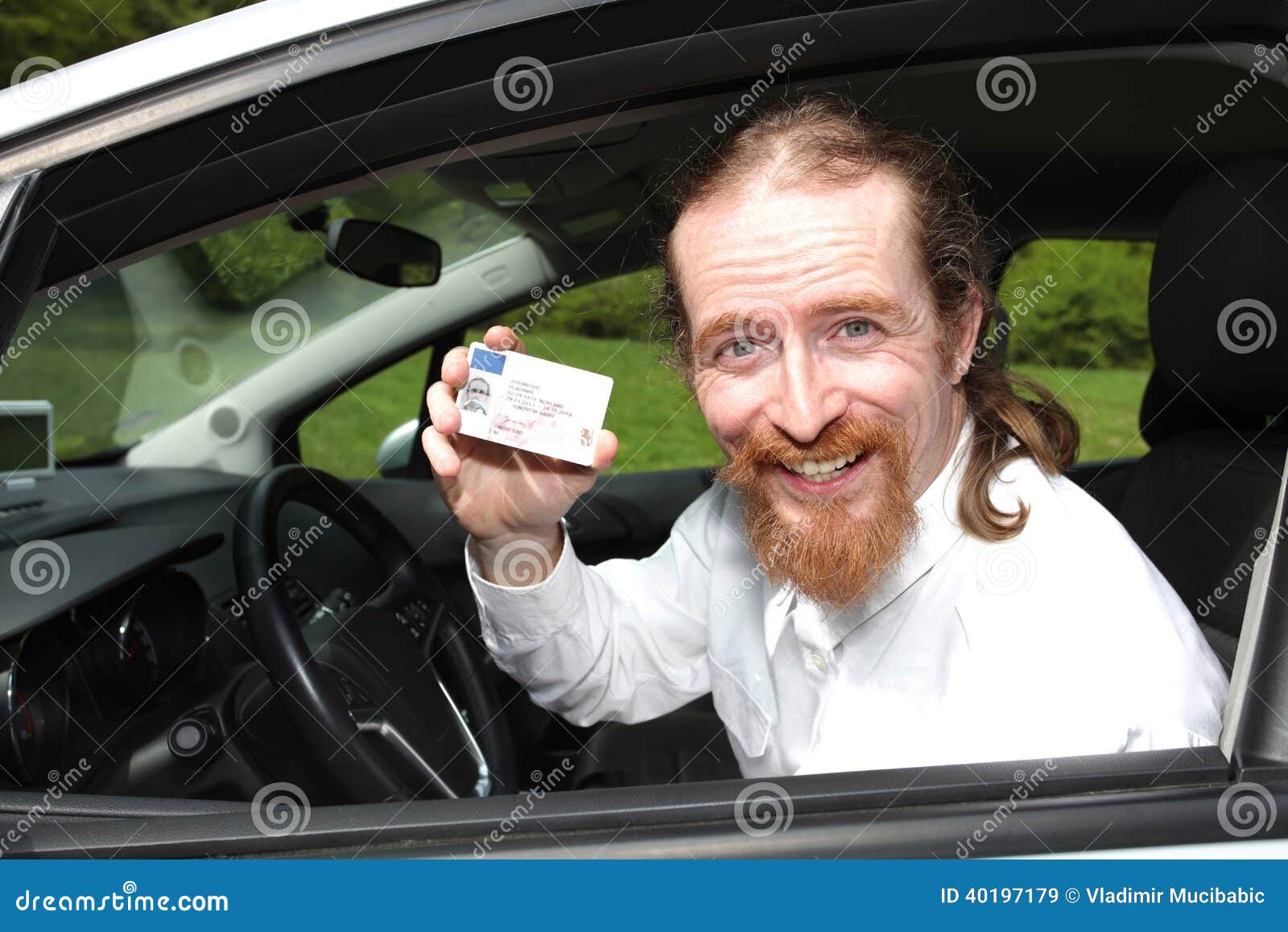 Driver Smiling Sitting in Car with Drivers License Stock Image - Image ...
