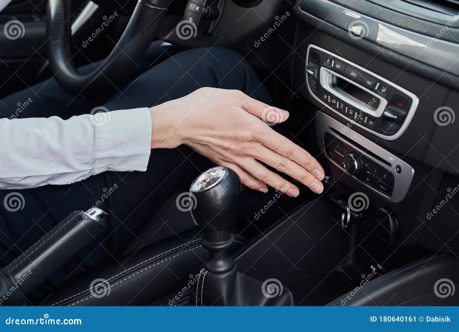 Driver Starting Car Engine with a Keyless System. Woman Press Start ...