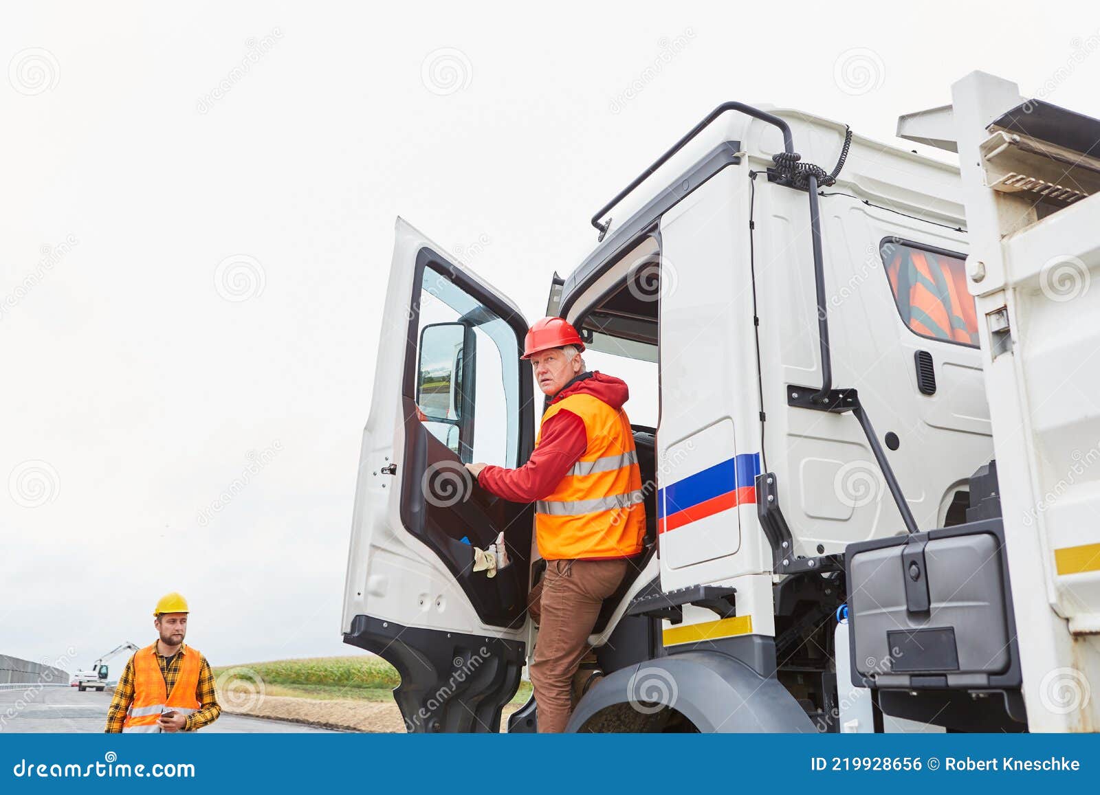 Driver in the Truck Cab on the Construction Site Stock Photo - Image of ...
