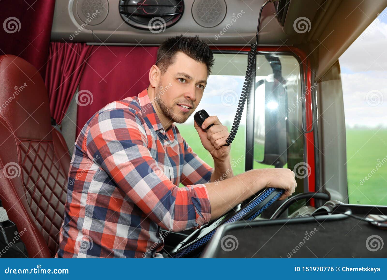 Driver Using CB Radio in Cab of Truck Stock Photo - Image of cargo ...