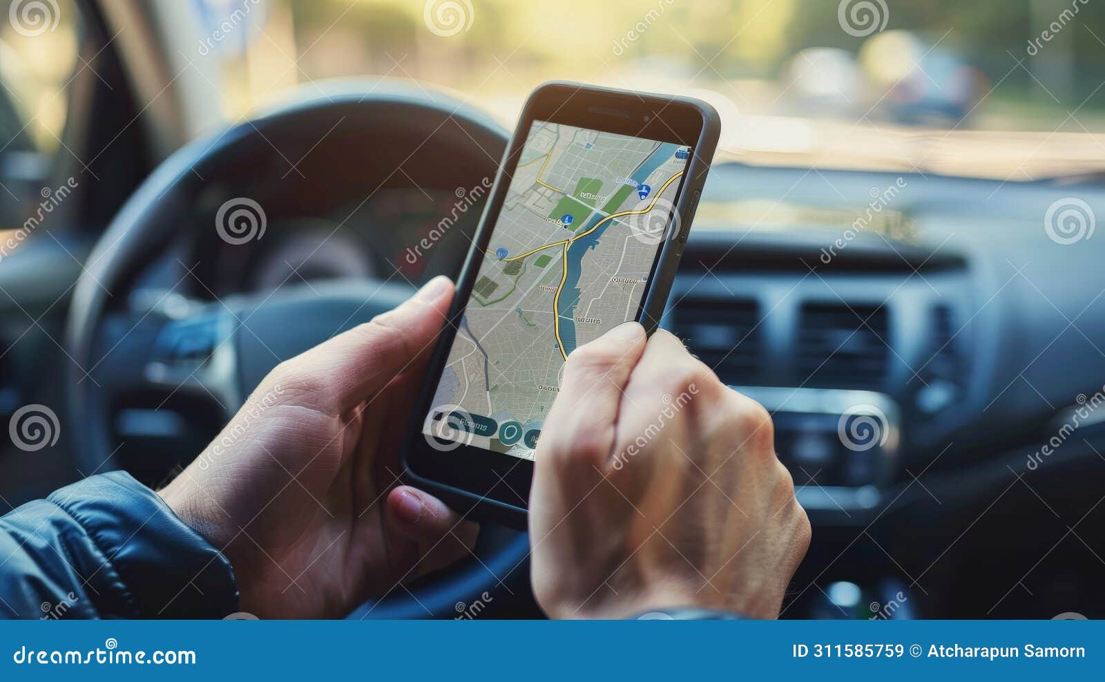 Driver Using GPS Navigation in Mobile Phone while Driving Car, Mobile ...