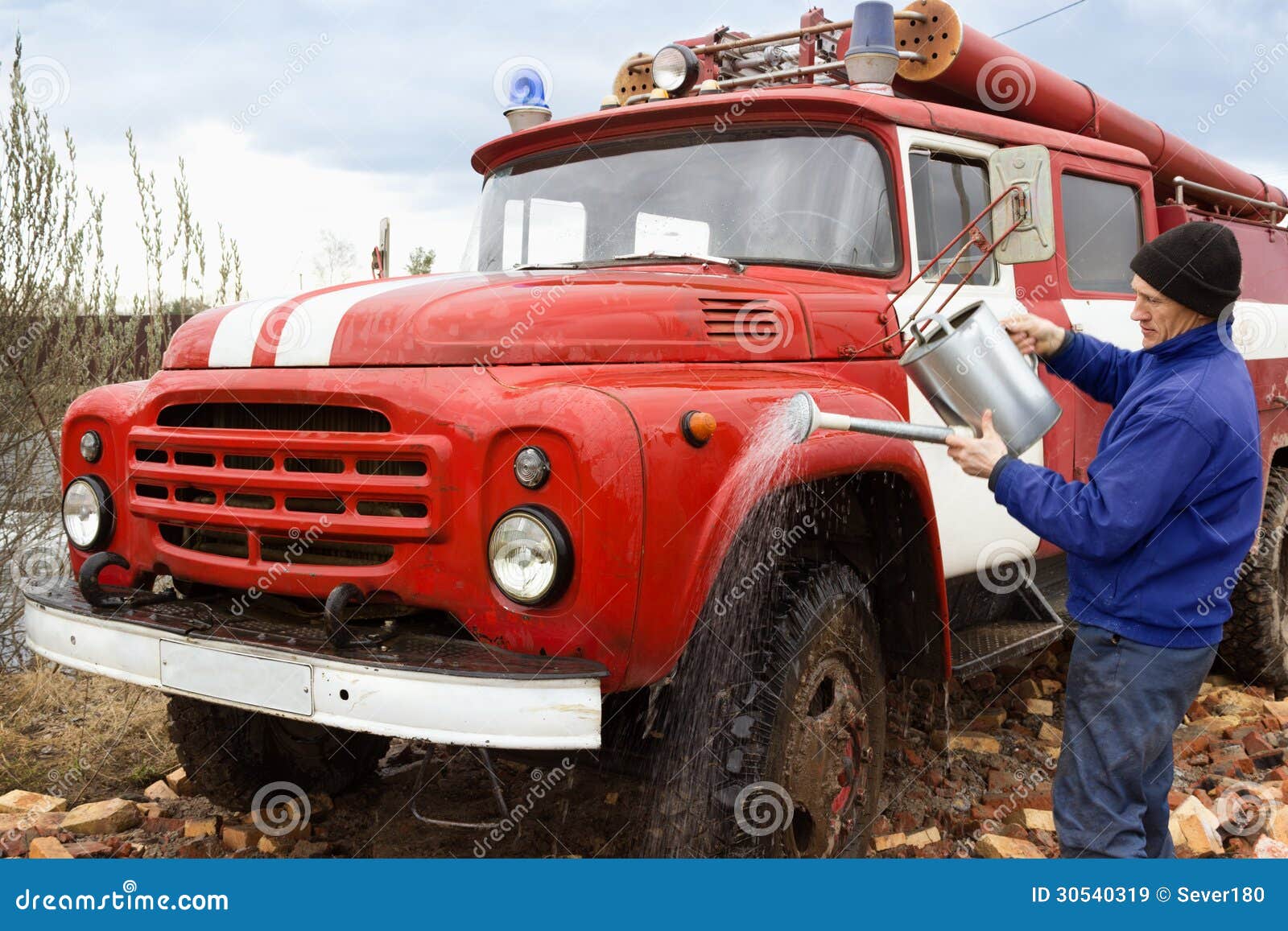 The Driver Washes The Old Fire Truck Stock Image | CartoonDealer.com ...
