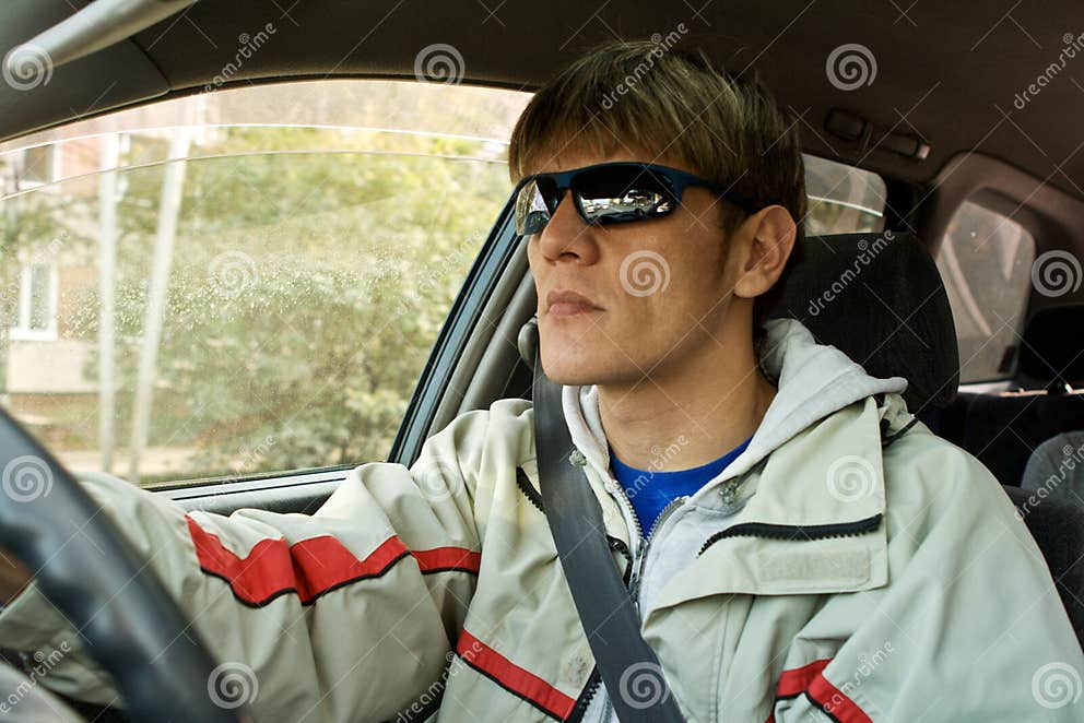 Driver at the wheel stock image. Image of face, horizontal - 20141901