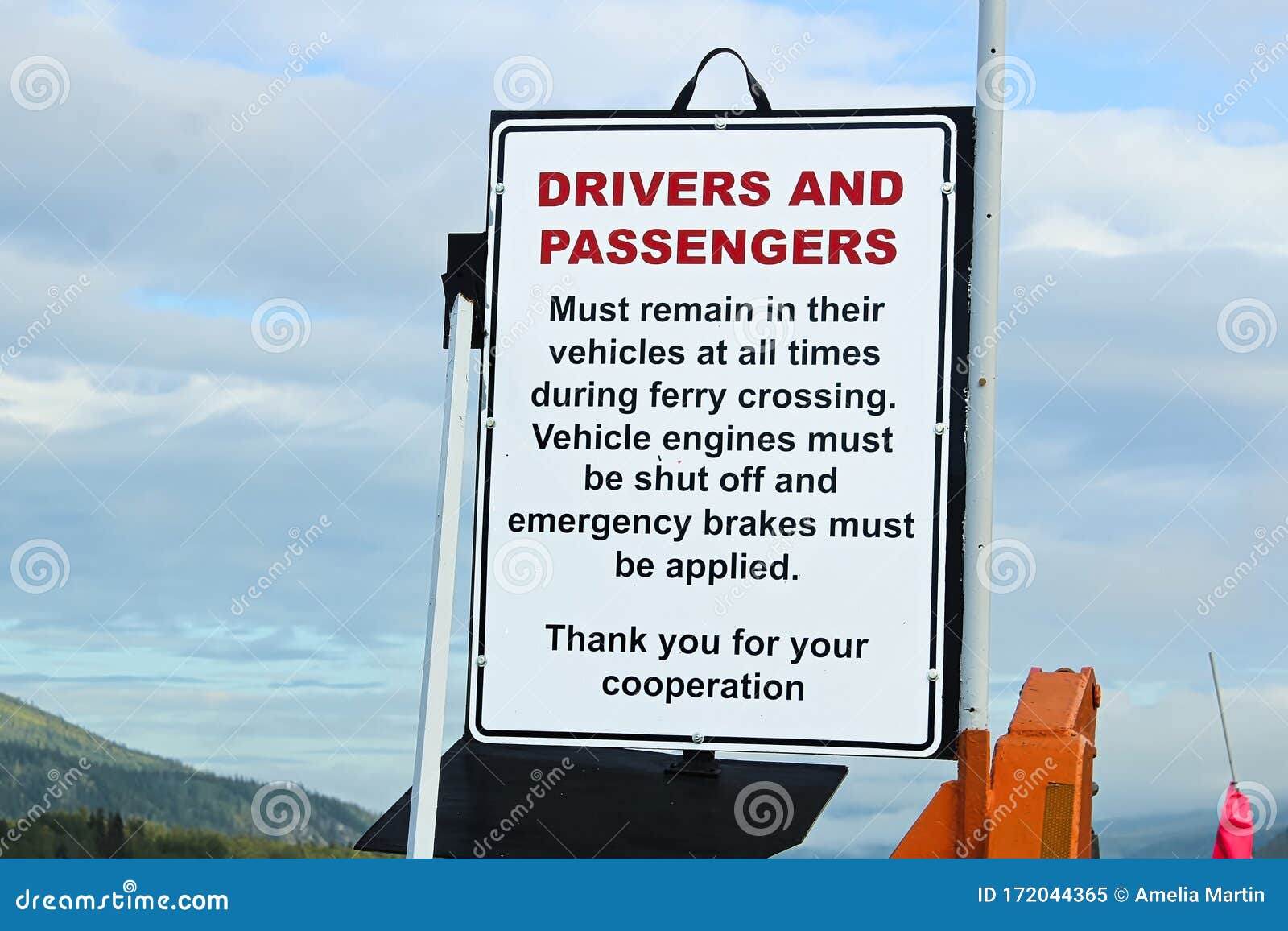 A Drivers and Passengers Must Remain in Vehicle Sign Stock Image ...