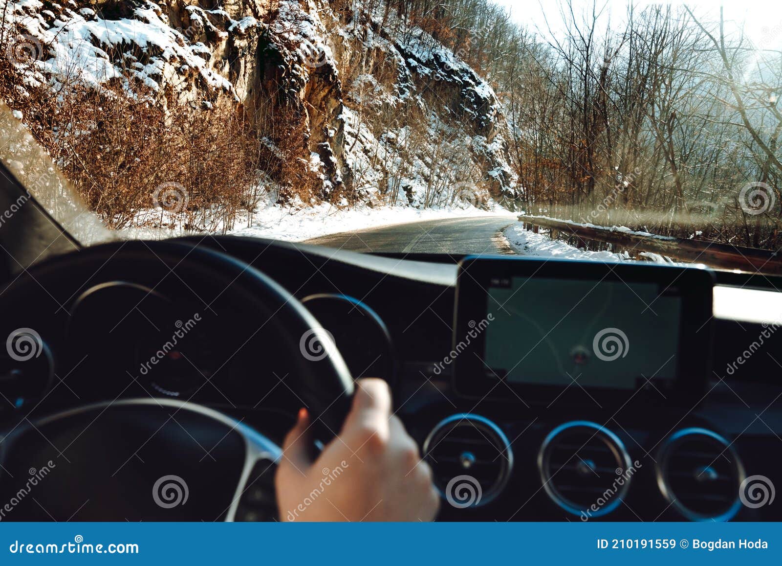 Drivers Point of View of the Road. Driver Holding Hands on Steering ...