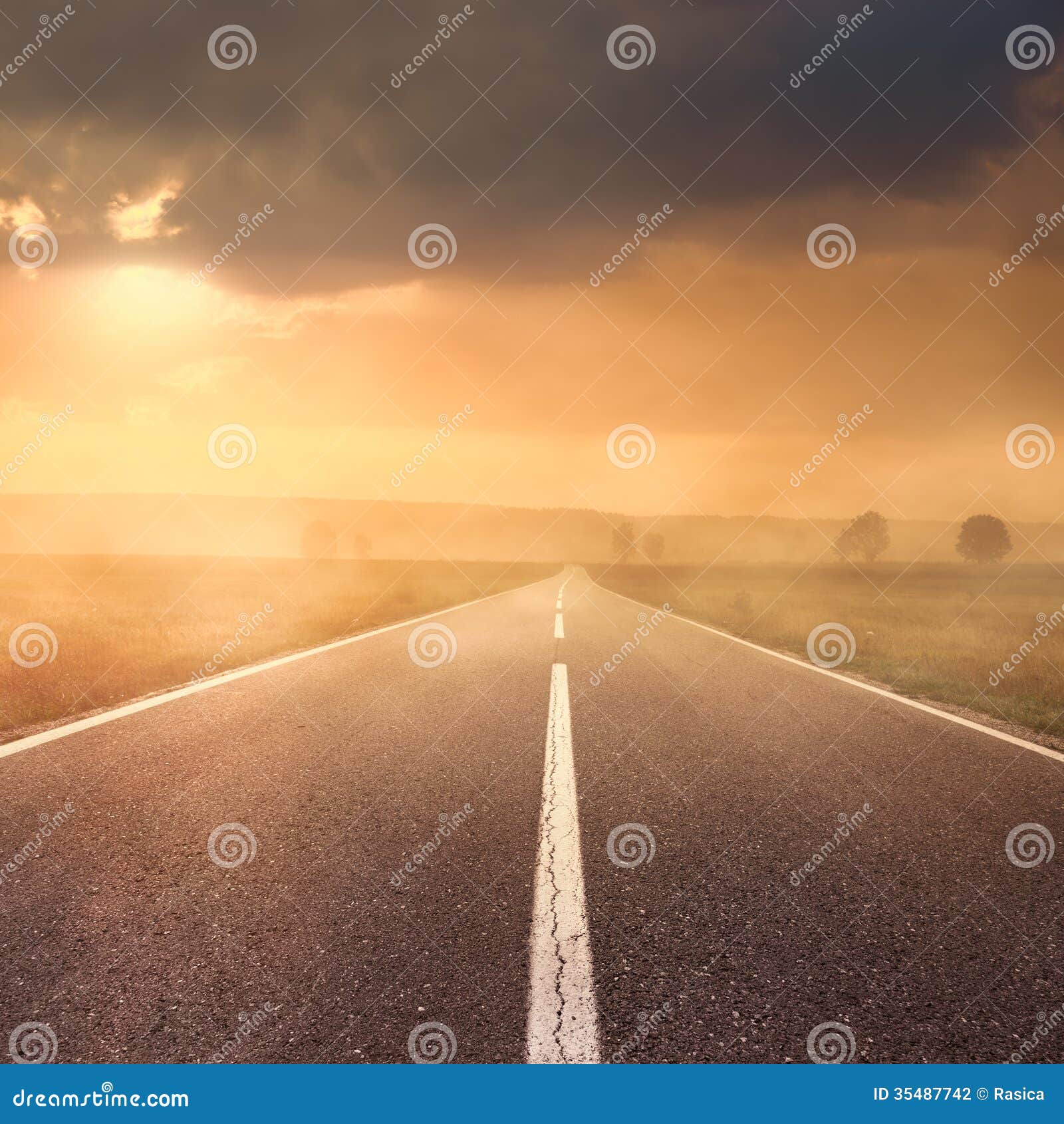 Driving on Asphalt Road at Sunset Towards the Sun II Stock Photo ...