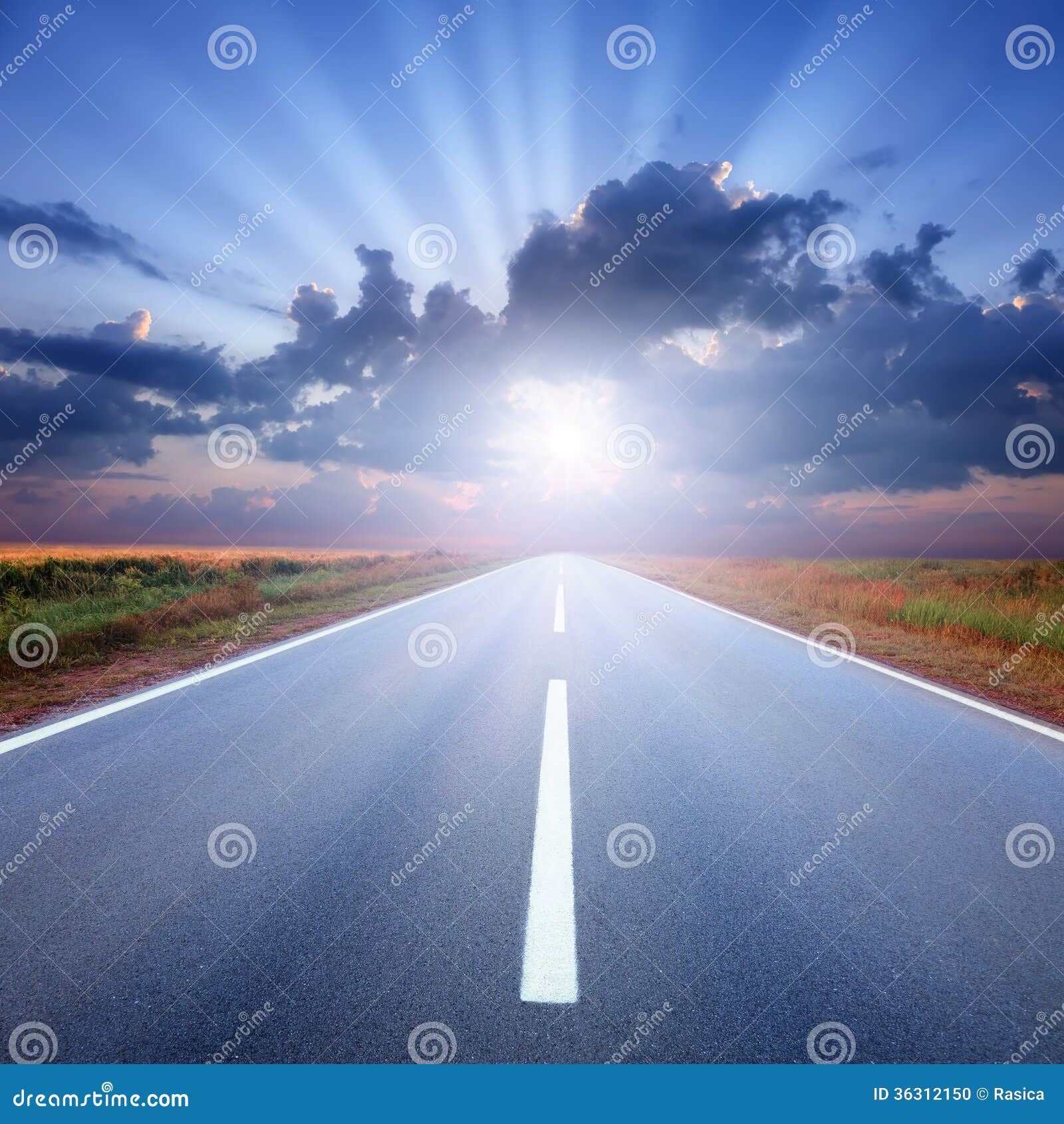 Driving on Asphalt Road Towards the Sunbeams Stock Photo - Image of ...