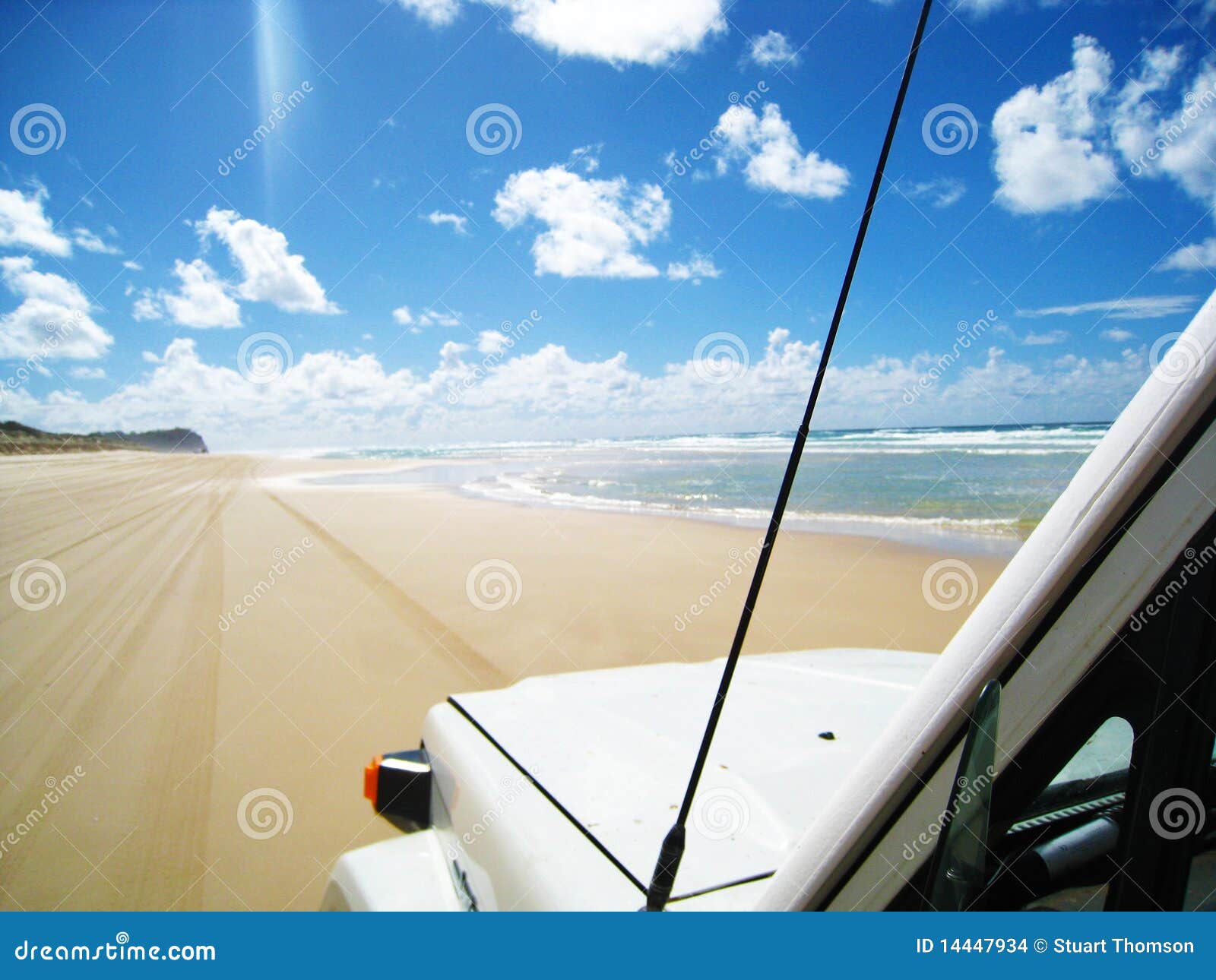 Driving on the beach stock photo. Image of waves, queensland - 14447934