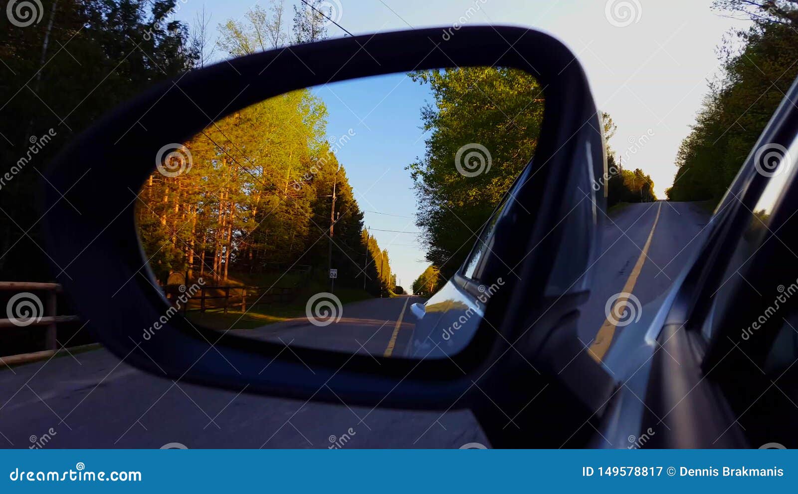 Driving Bumpy Rural Road View of Side Mirror in Daytime. Driver Point ...