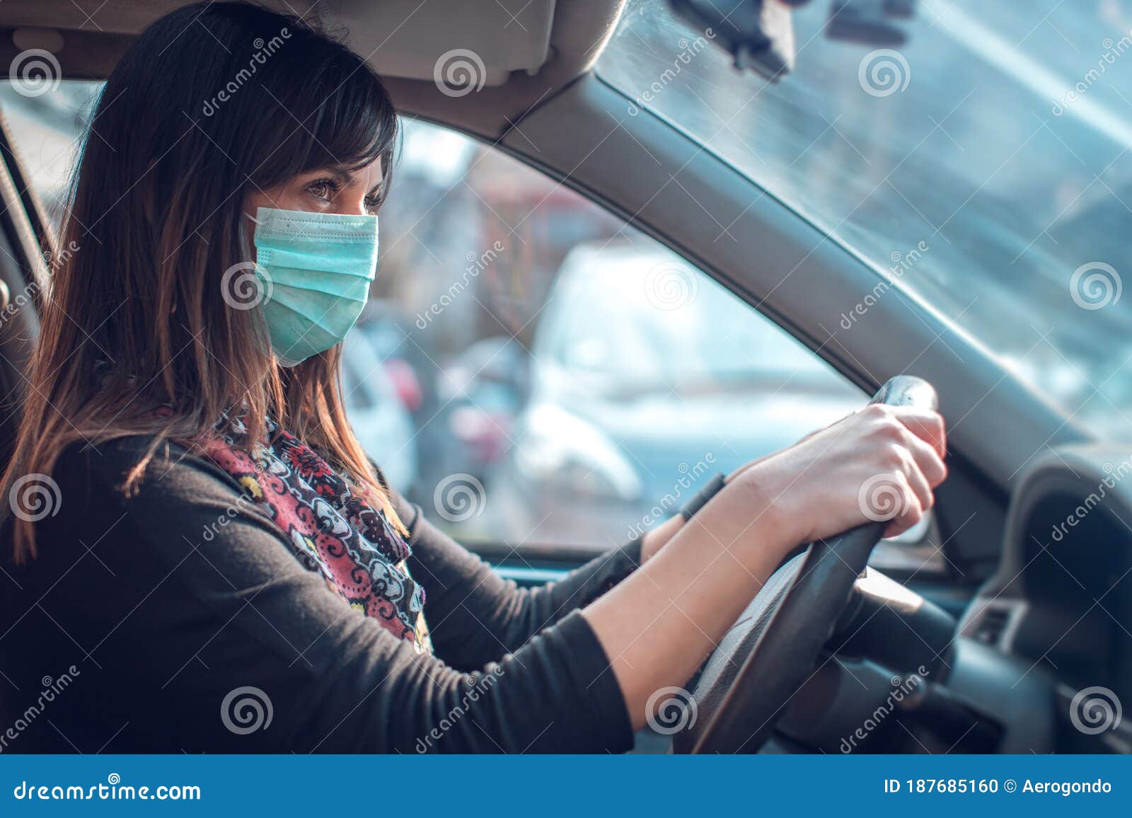 Driving car with face mask stock photo. Image of automobile - 187685160