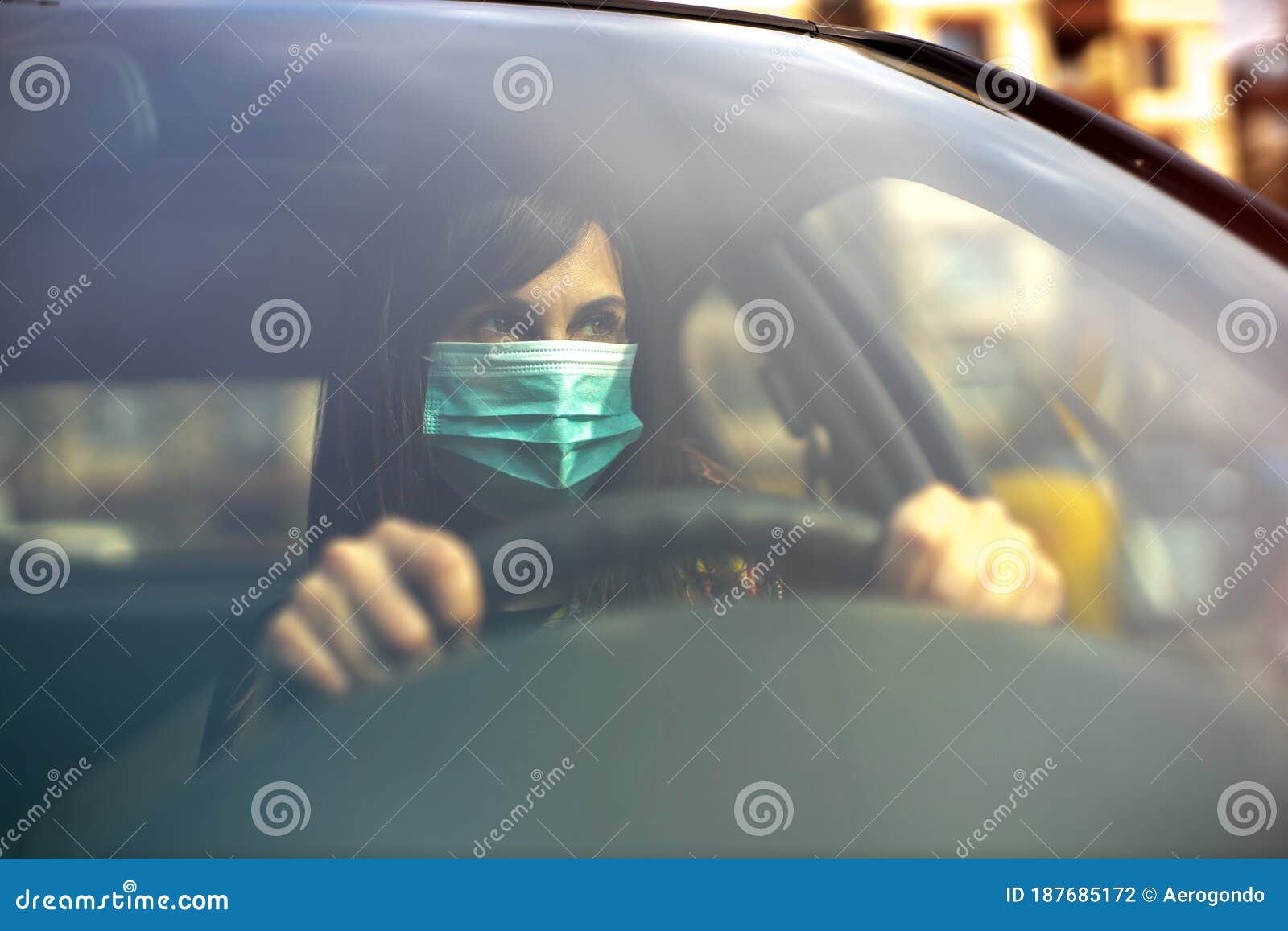 Driving car with face mask stock photo. Image of care - 187685172