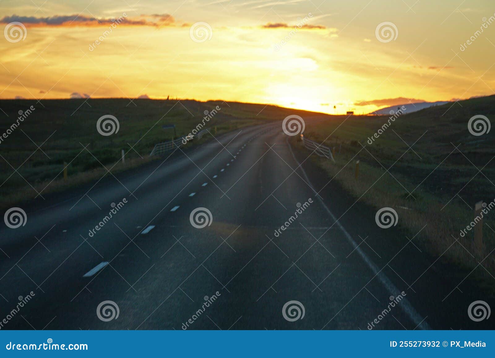 Driving a car, sunset sky stock photo. Image of road - 255273932