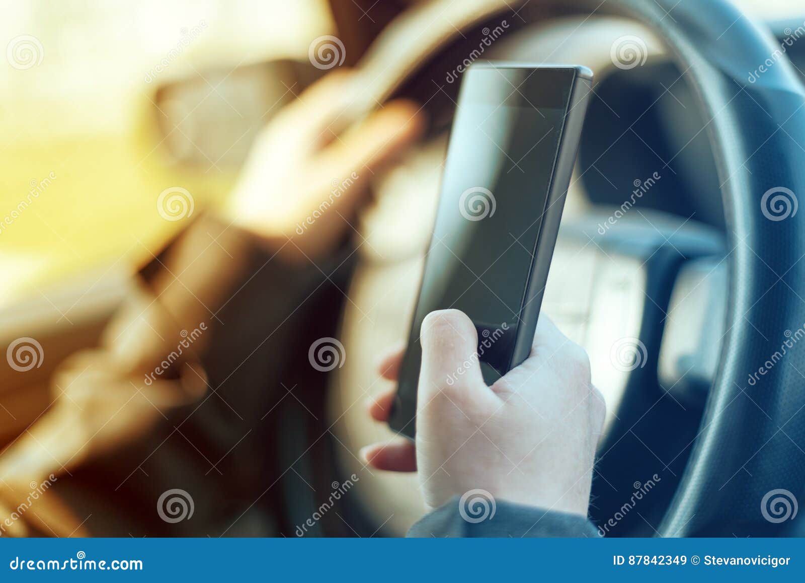 Driving Car and Using Mobile Phone To Send Text Message Stock Image ...