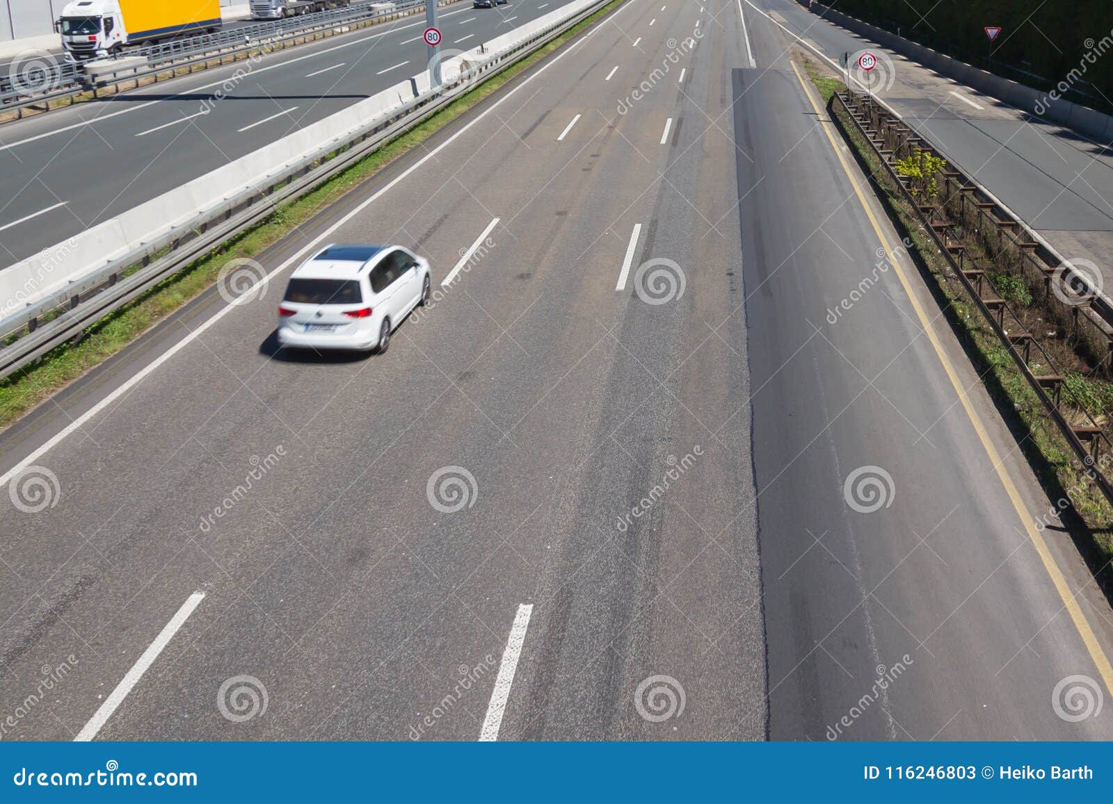 Driving Constantly Left on a Three-lane Highway Stock Image - Image of ...