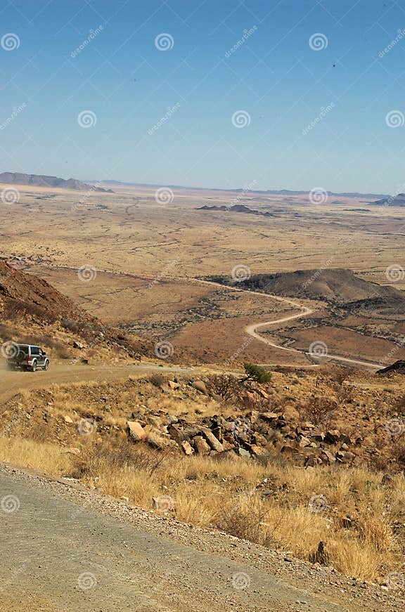 Driving Down the Desert Pass Stock Photo - Image of emotions, hill: 1005160
