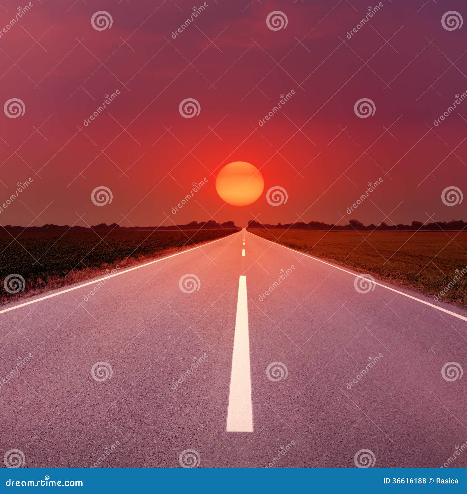 Driving on an Empty Highway Towards the Setting Sun Stock Photo - Image ...
