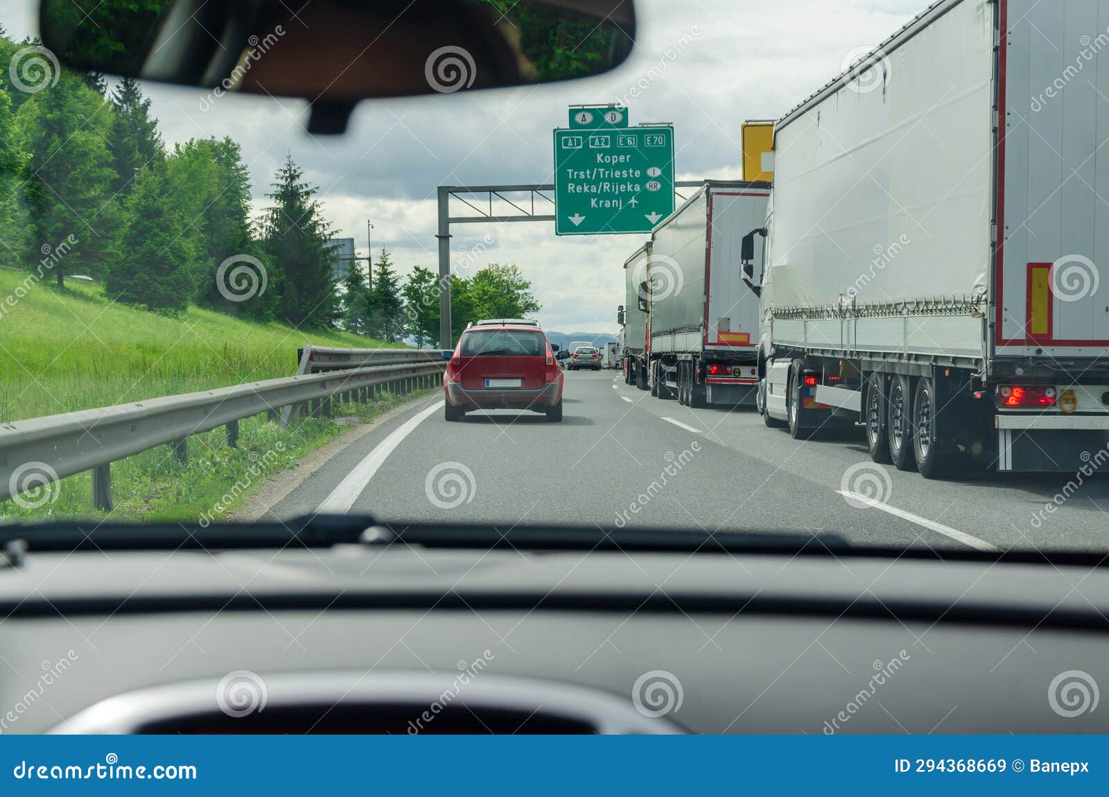 Driving on a Highway and Passing by a Row of Trucks Stock Image - Image ...