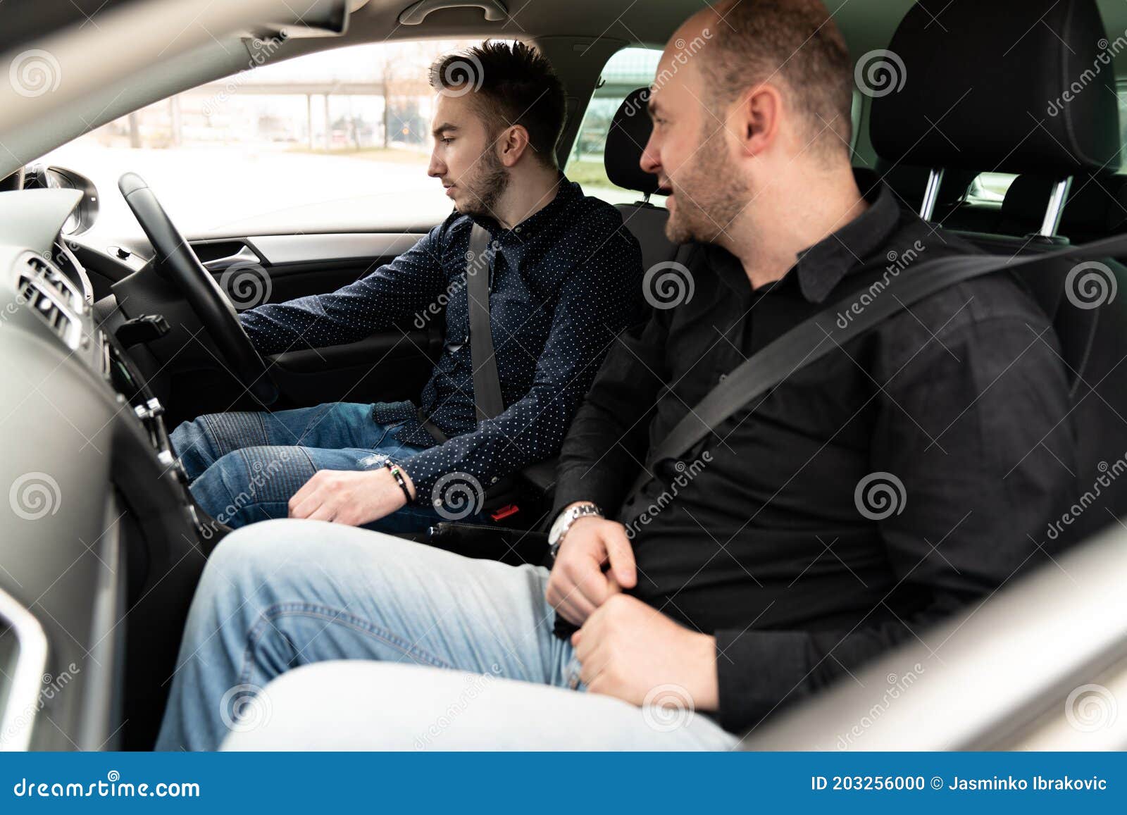 Driving Instructor and Man Student in Examination Car Stock Photo ...