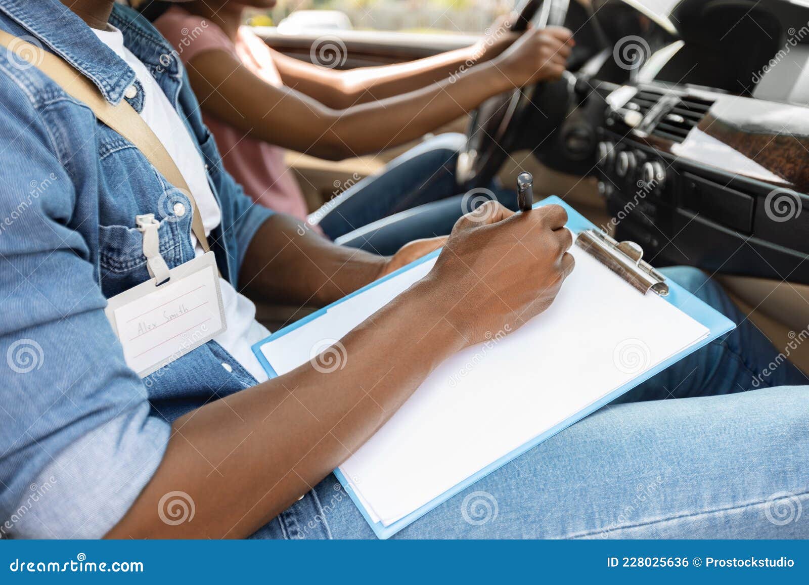 Driving Instructor Taking Notes during Exam, Driving School Concept ...