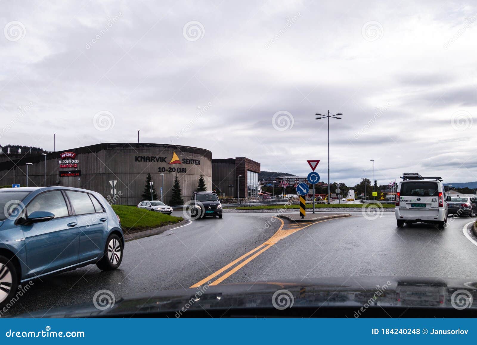 Driving through Knarvik Norway with the Shopping Mall on the Left Side ...