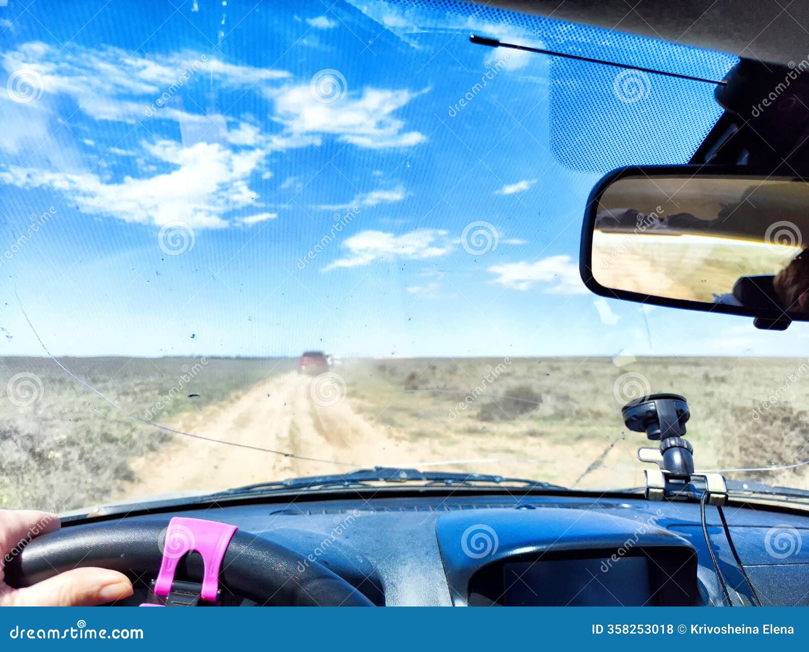 Driving on an Open Road with a Cracked Windshield and a Scenic View of ...