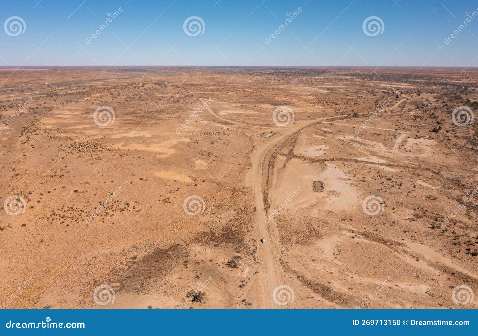 Driving through the Outback Desert. Stock Photo - Image of unsealed ...